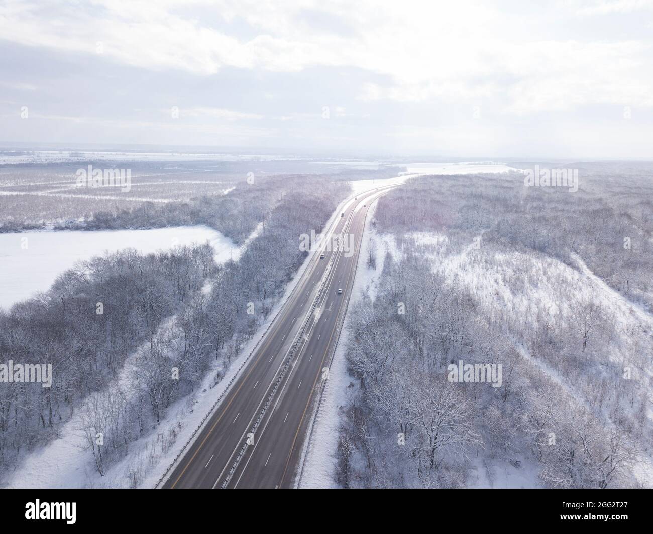 Winter Driving - commuter traffic on a highway - expressway - snowfall ...