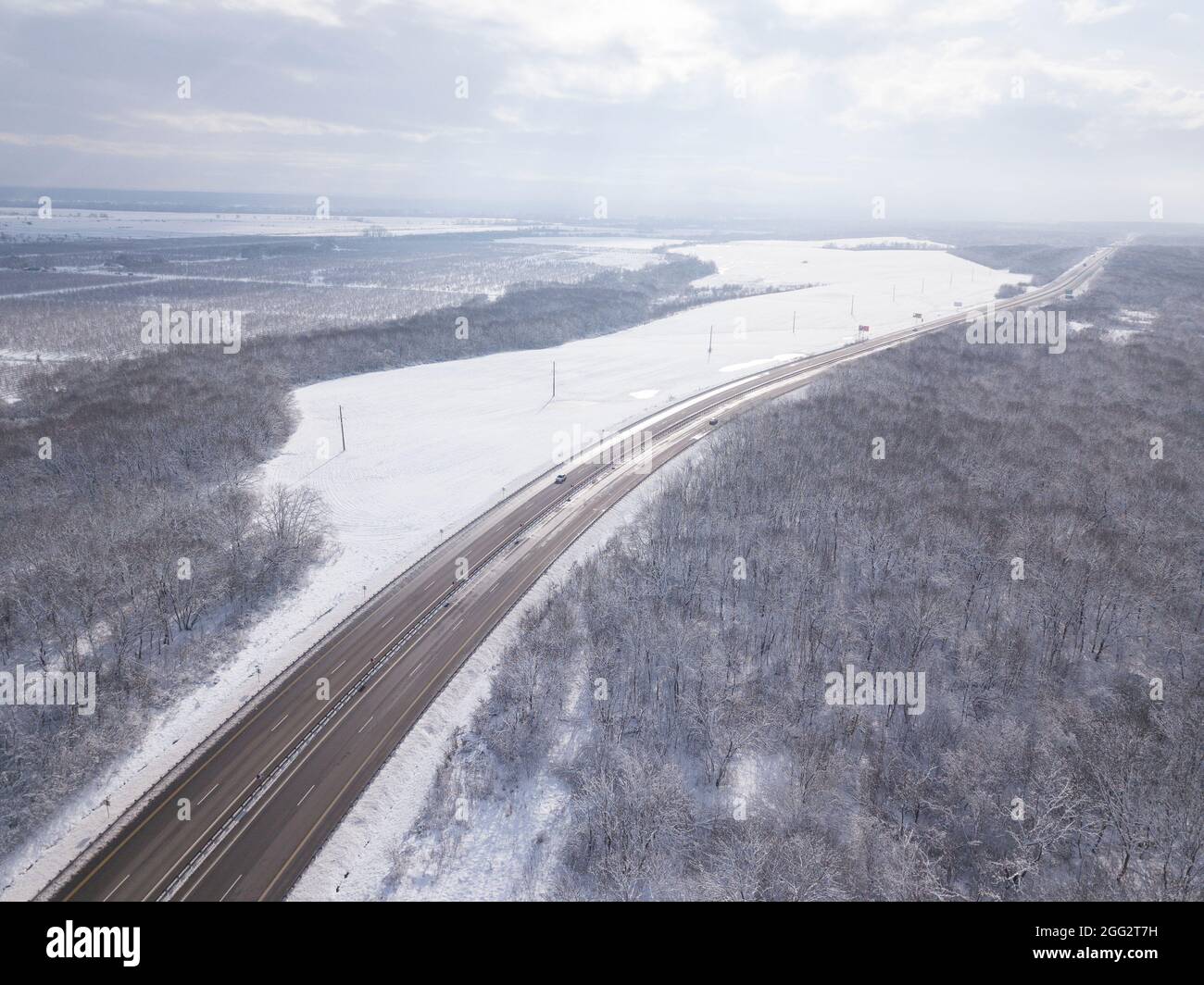 Winter Driving - commuter traffic on a highway - expressway - snowfall ...