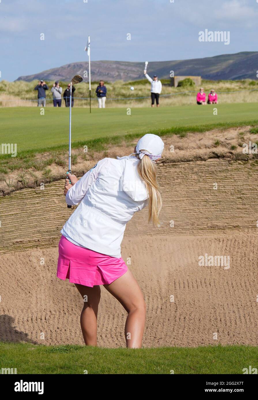 Team GB&I's Annabell Fuller plays from a bunker on the 14th hole during ...
