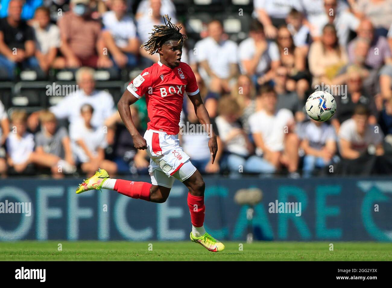 Alex Mighten #17 of Nottingham Forest runs with the ball Stock Photo ...