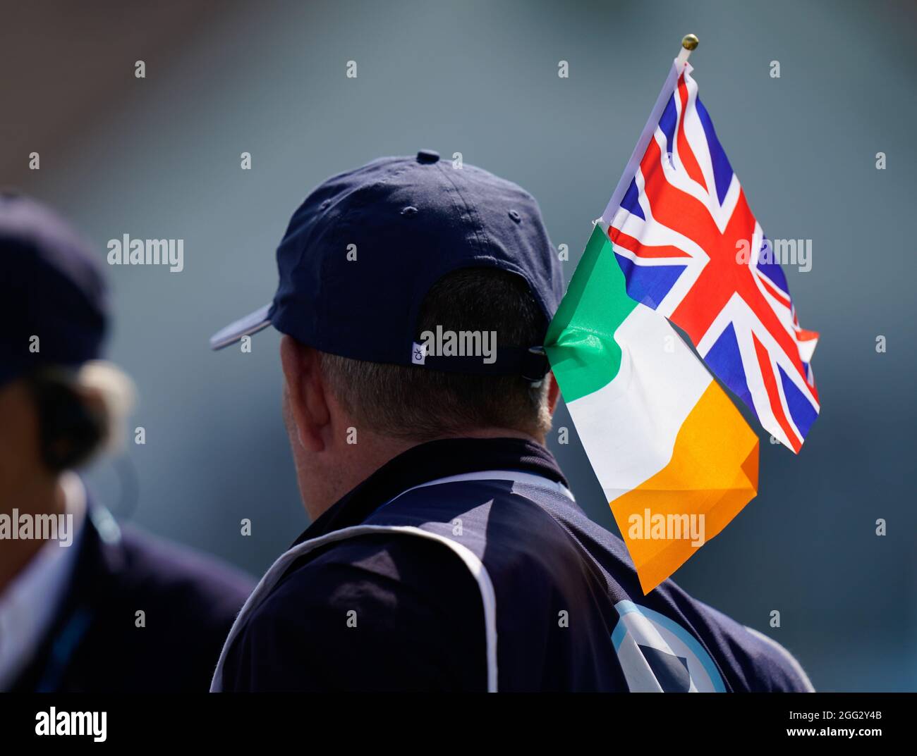 Team GB&I caddie wears flags in his cap during the 2021 Curtis Cup Day ...