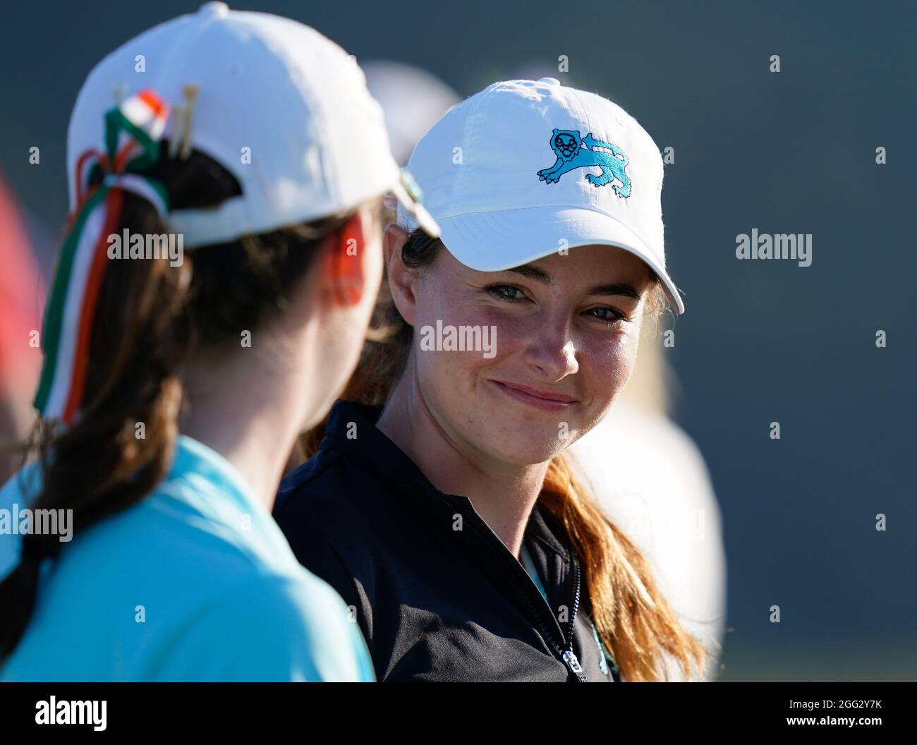 Team GB&I's Caley McGinty smiles at her partner Lauren Walsh during the ...