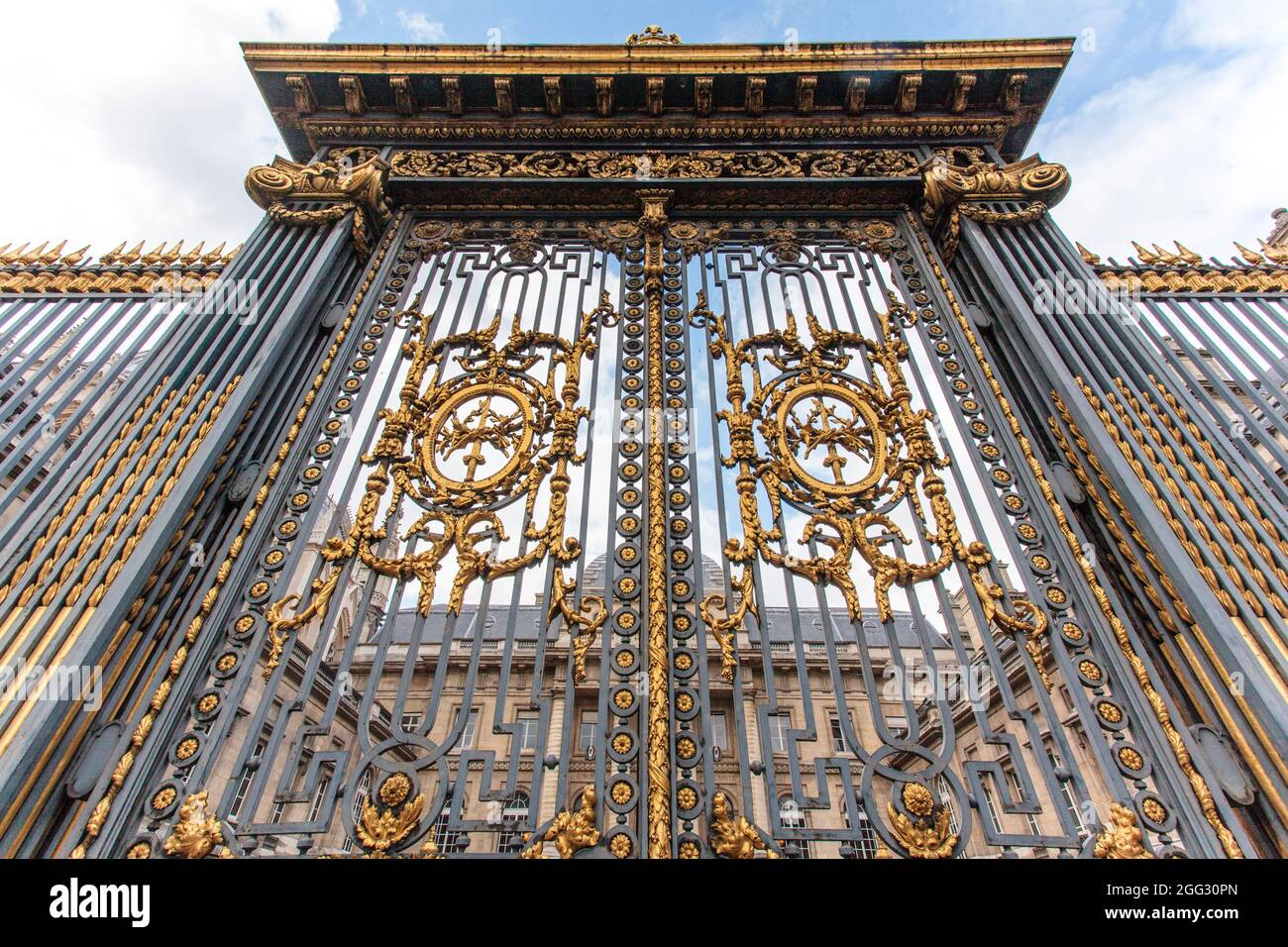 Ornate entrance gate of the Palais de Justice, a courthouse in Paris ...