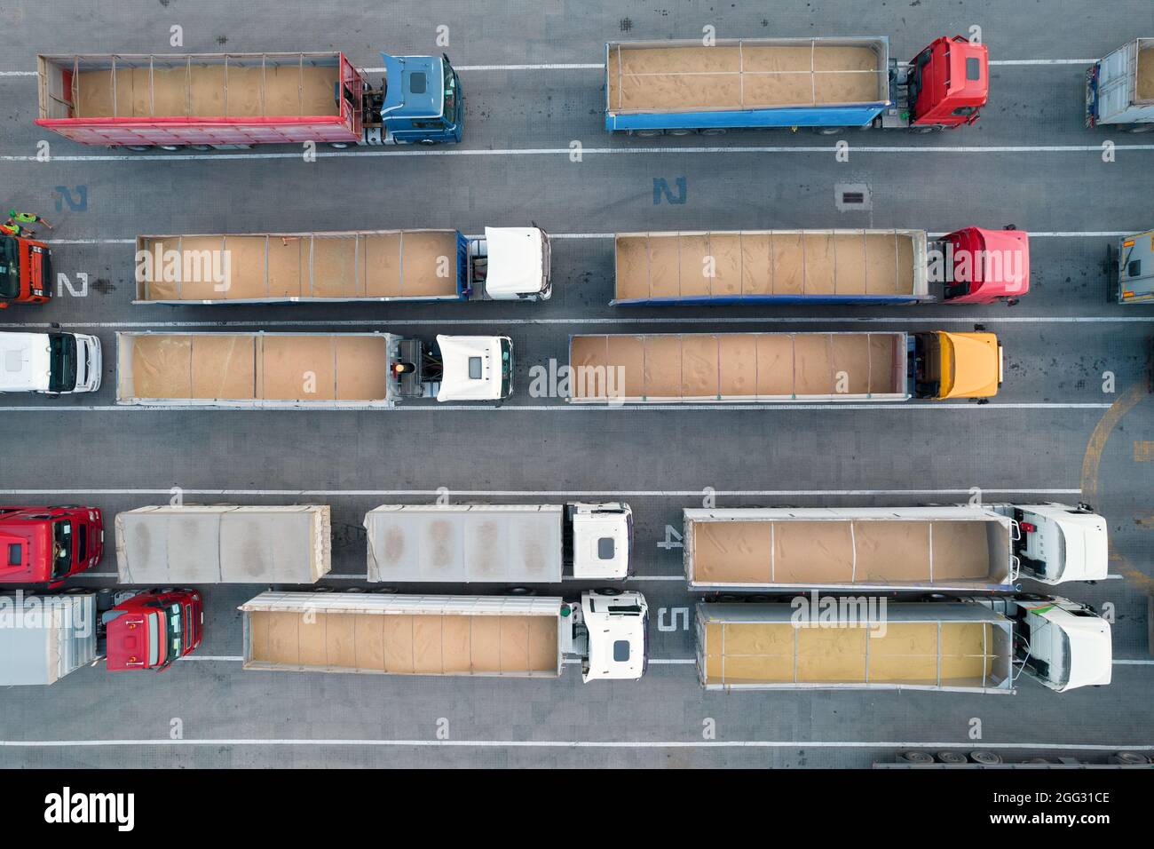 Many trucks are waiting in line for unloading in the port harbor, top ...