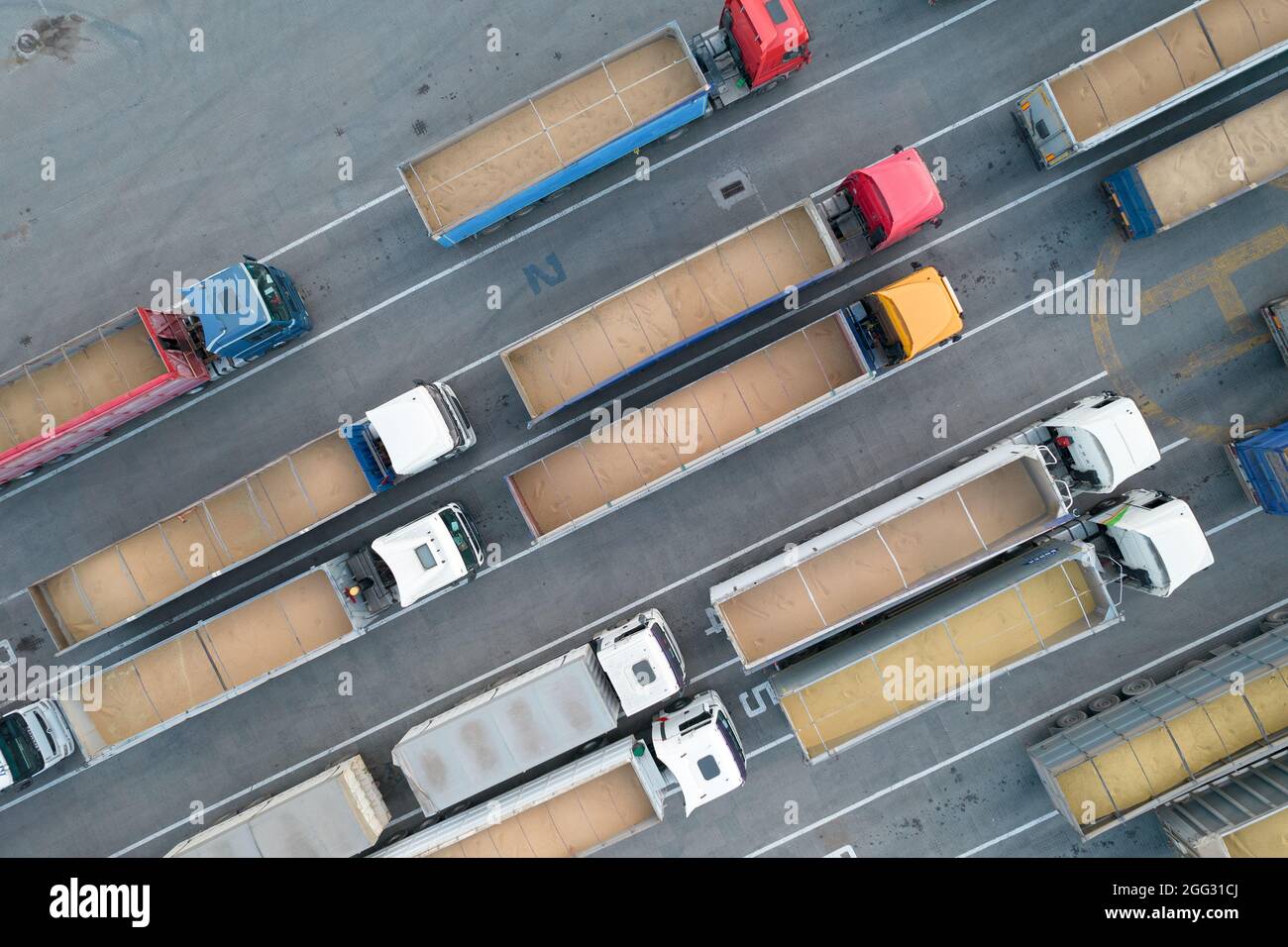Cargo transportation. Many trucks are waiting in line for unloading in ...