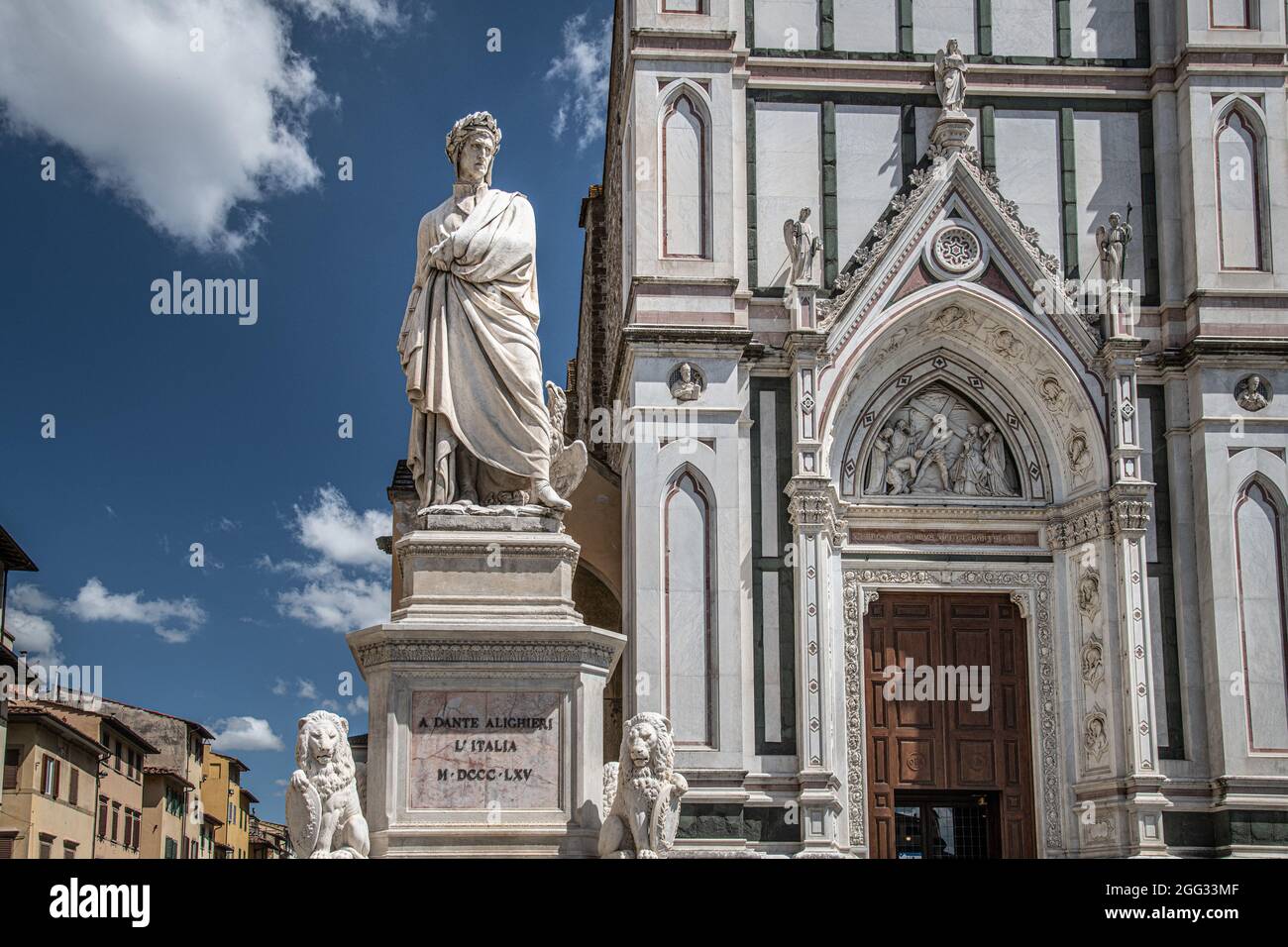 The statue of Dante Alighieri in front of the Basilica of Santa Croce ...