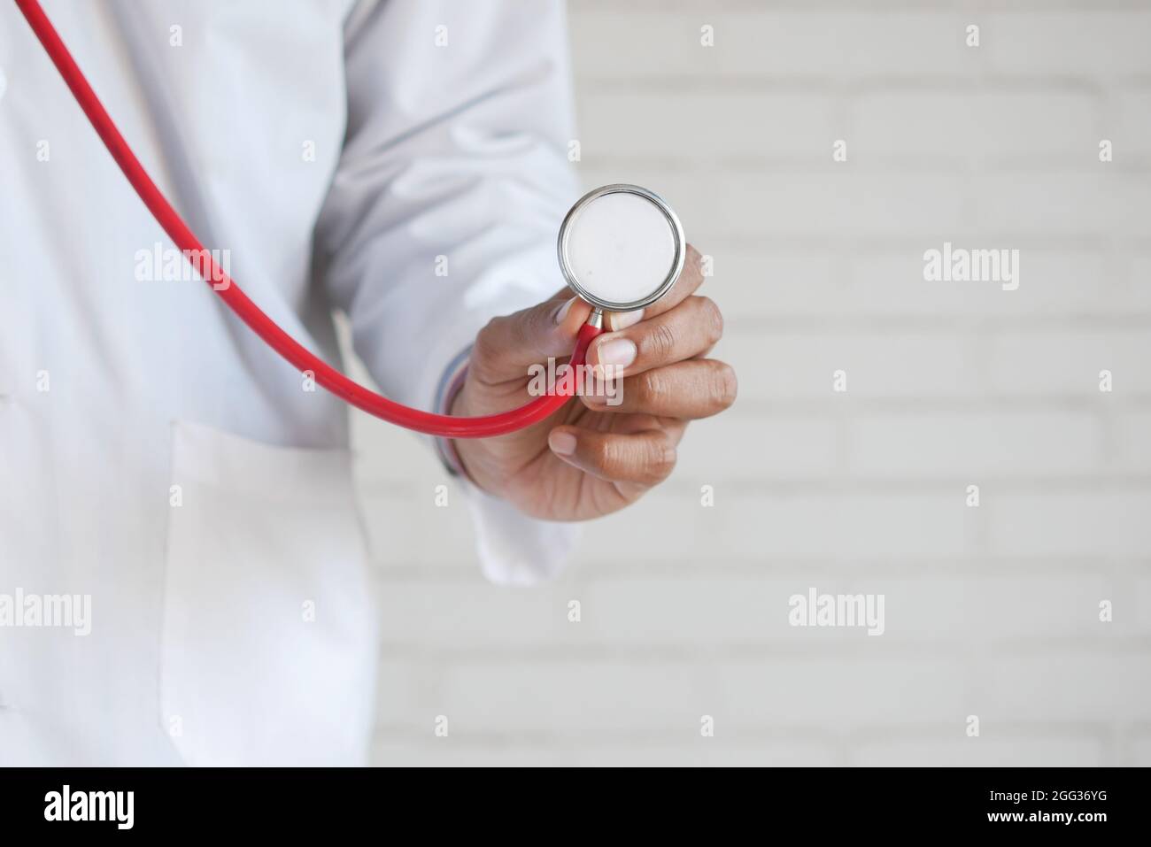 Close up doctor using stethoscope hi-res stock photography and images ...