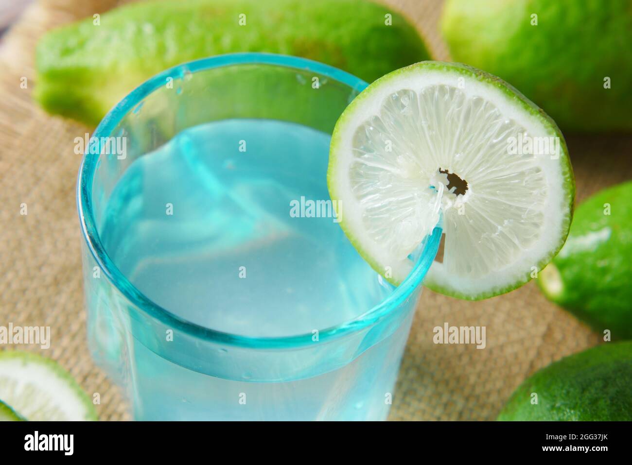 Refreshing lemon water drink on table , top view Stock Photo - Alamy
