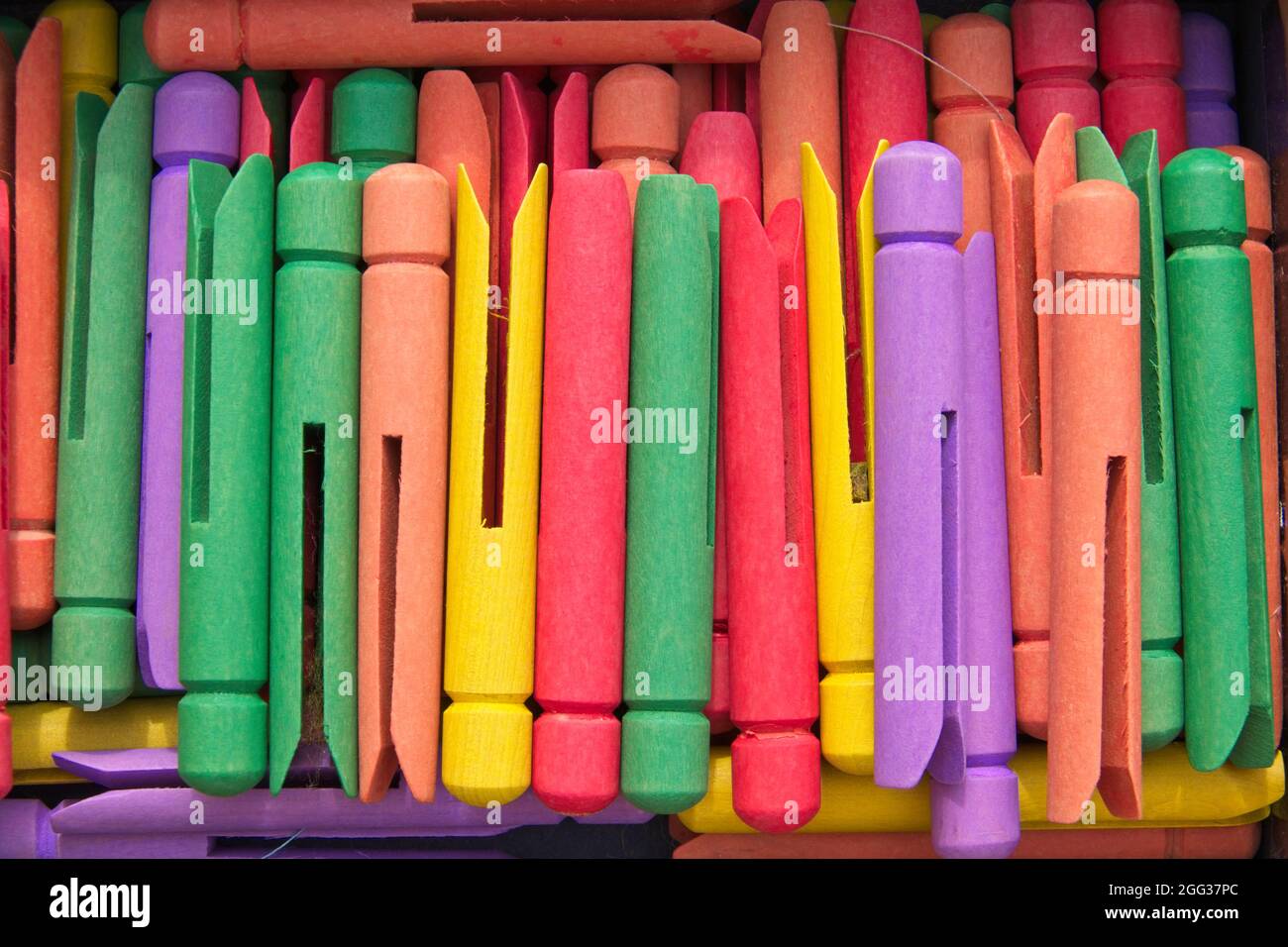 Coloured pegs, washing line pegs Stock Photo - Alamy