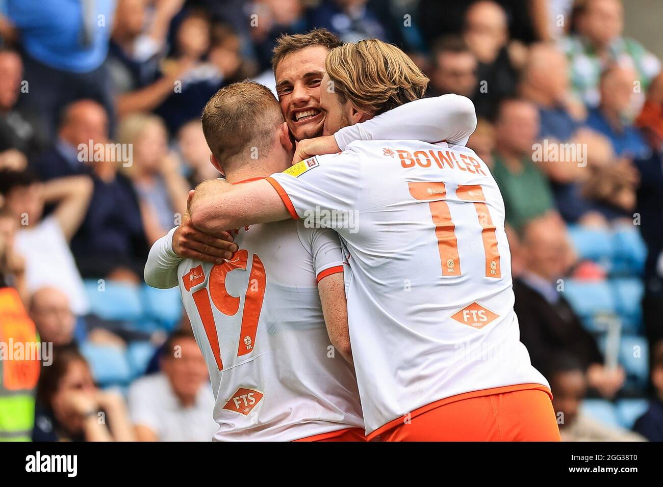 Shayne Lavery #19 of Blackpool celebrates his goal with team mates in ...
