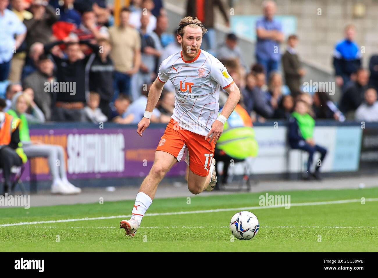 Josh Bowler #11 of Blackpool makes a break with the ball Stock Photo ...
