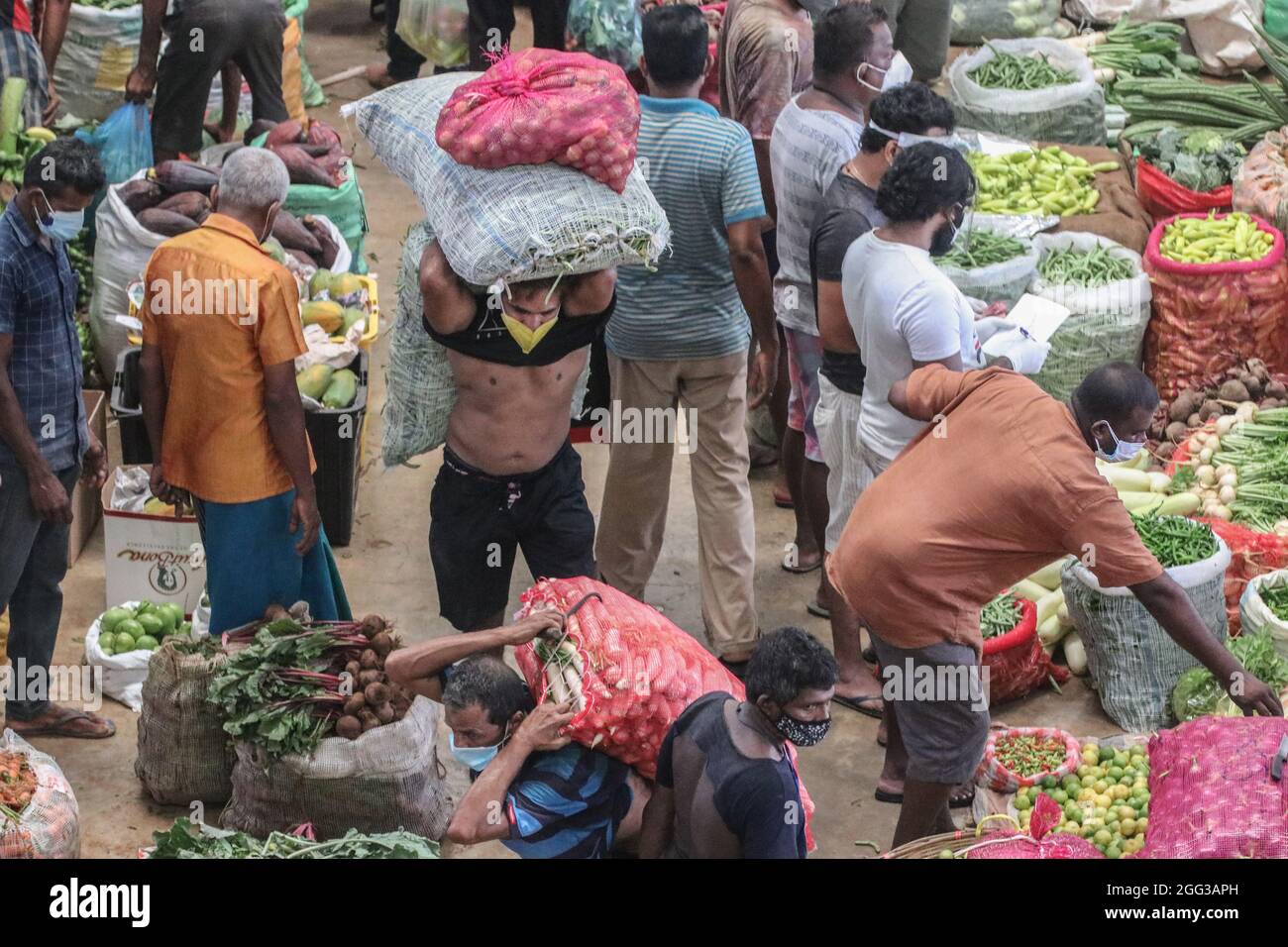 Vendors at the vegetables section of the Manning Market in Colombo, the ...