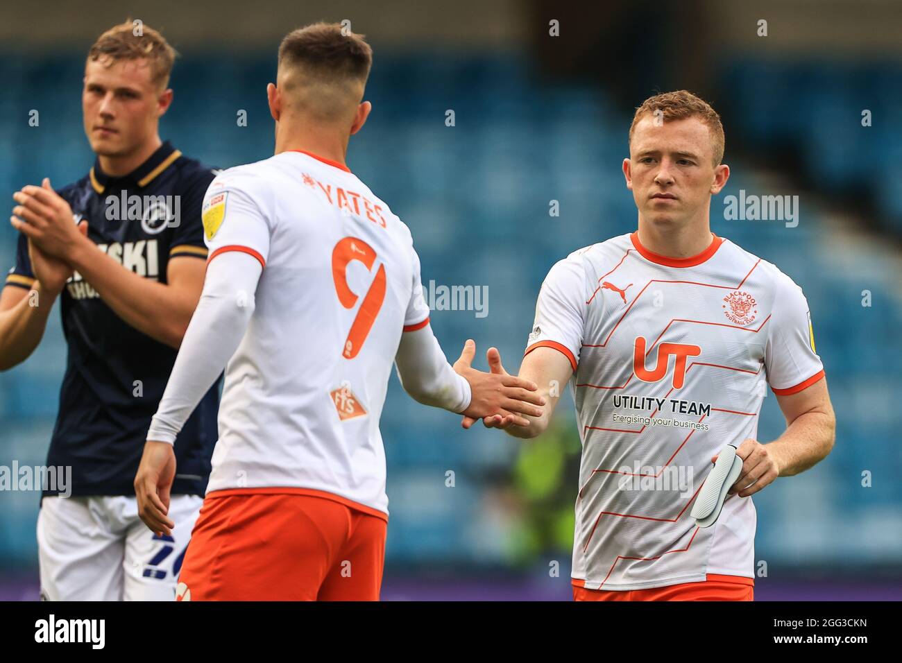 Jerry Yates #9 of Blackpool and Shayne Lavery #19 shake hands after the ...
