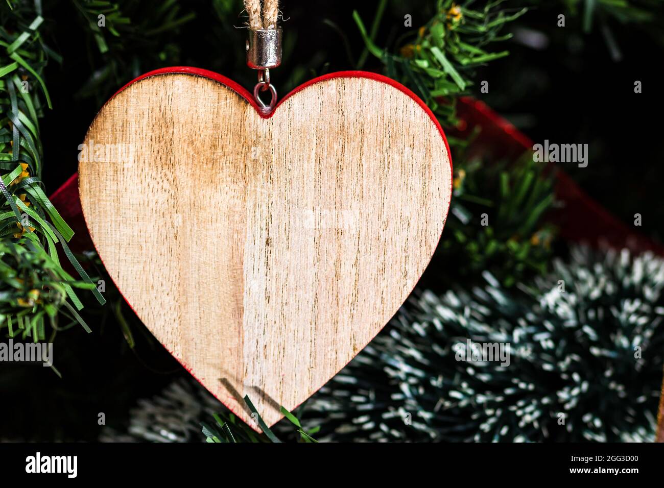 Heart shaped Christmas ornament hanging in the Christmas tree Stock ...