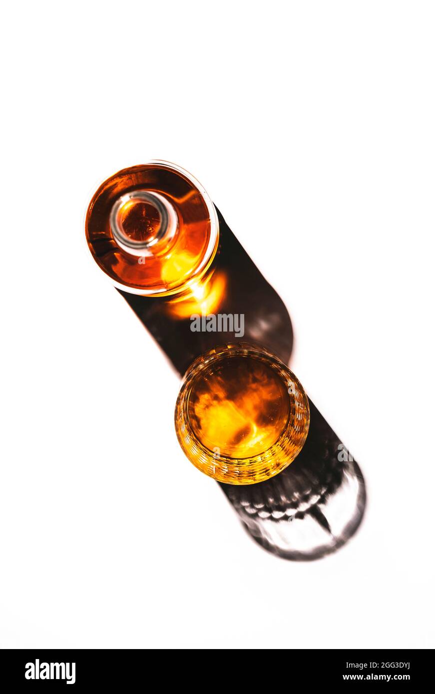 American bourbon whiskey in glass and bottle, white background with ...