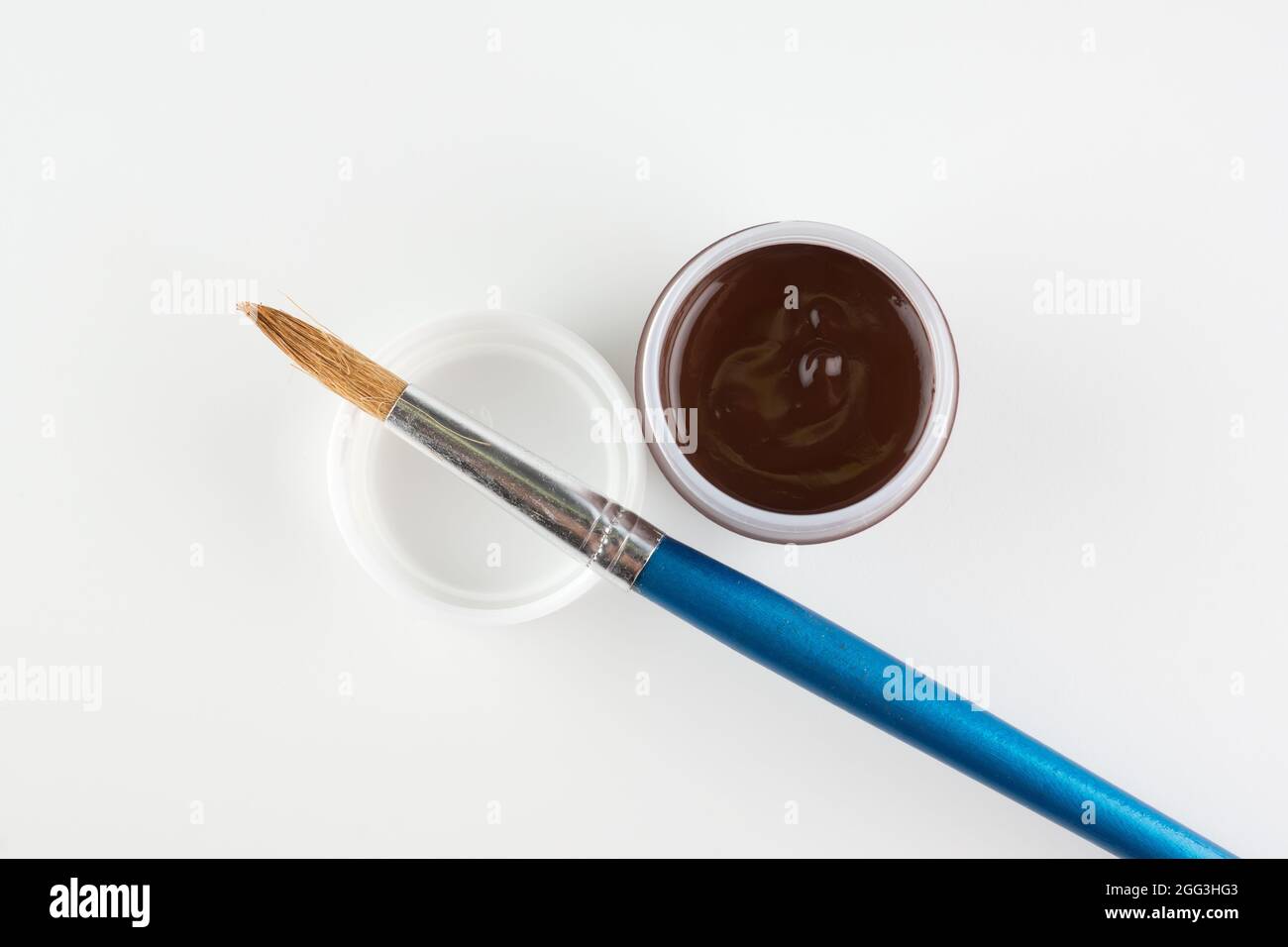 jars of colored paint for creativity on a white background Stock Photo ...