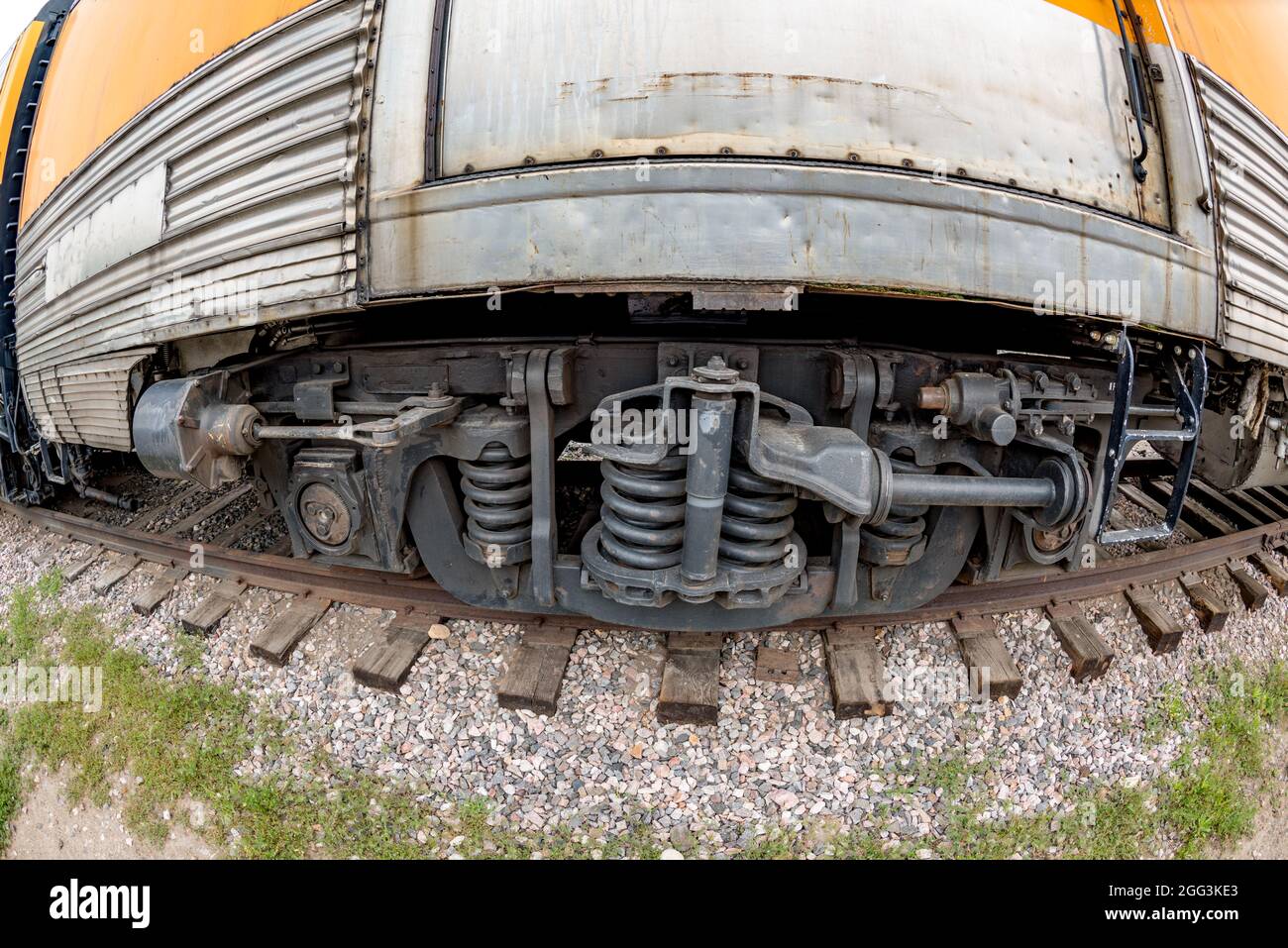 Made of harden steel train undercarriage on tracks Stock Photo - Alamy