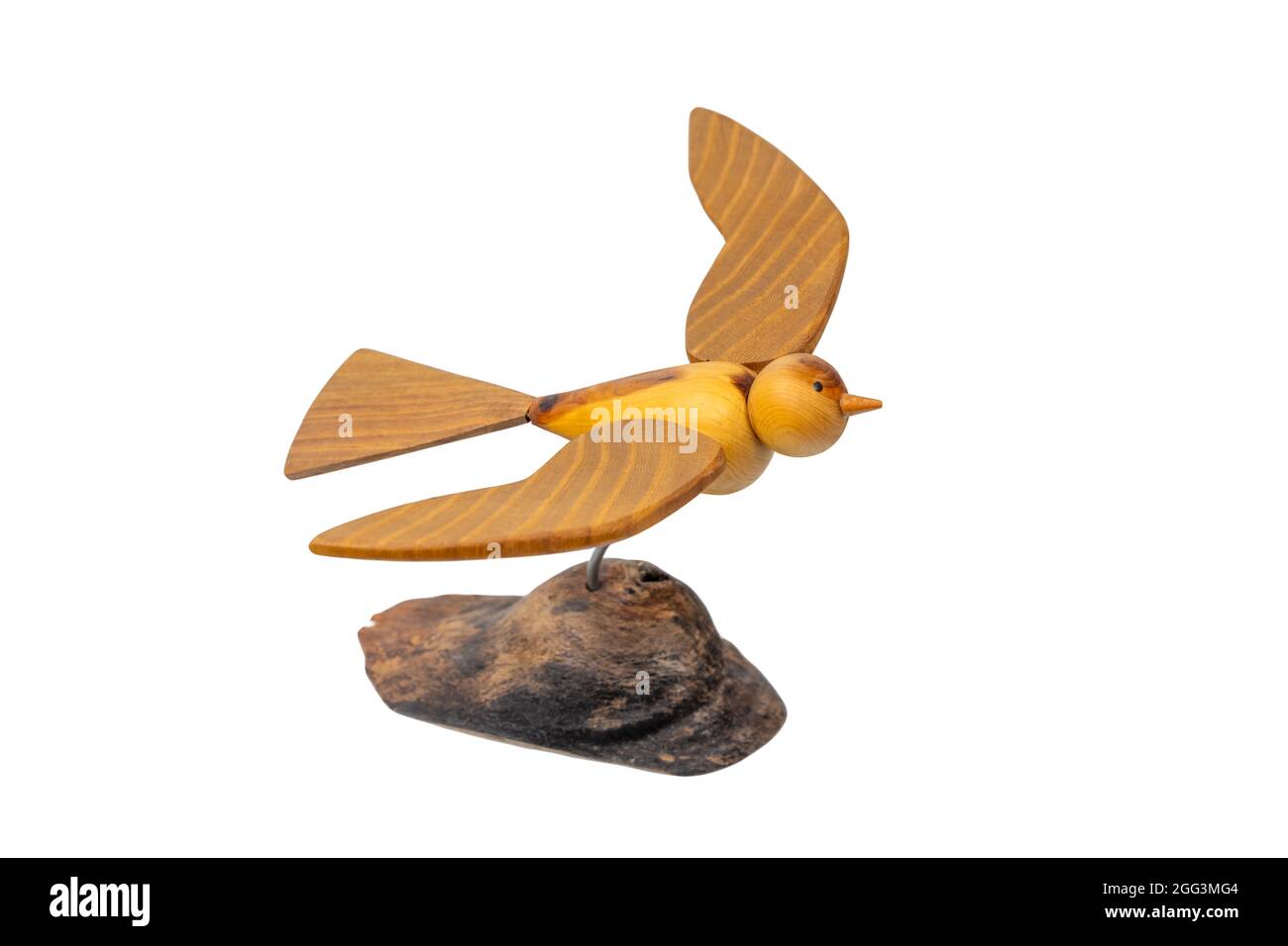 Wooden model of a turned flying bird isolated on white Stock Photo - Alamy