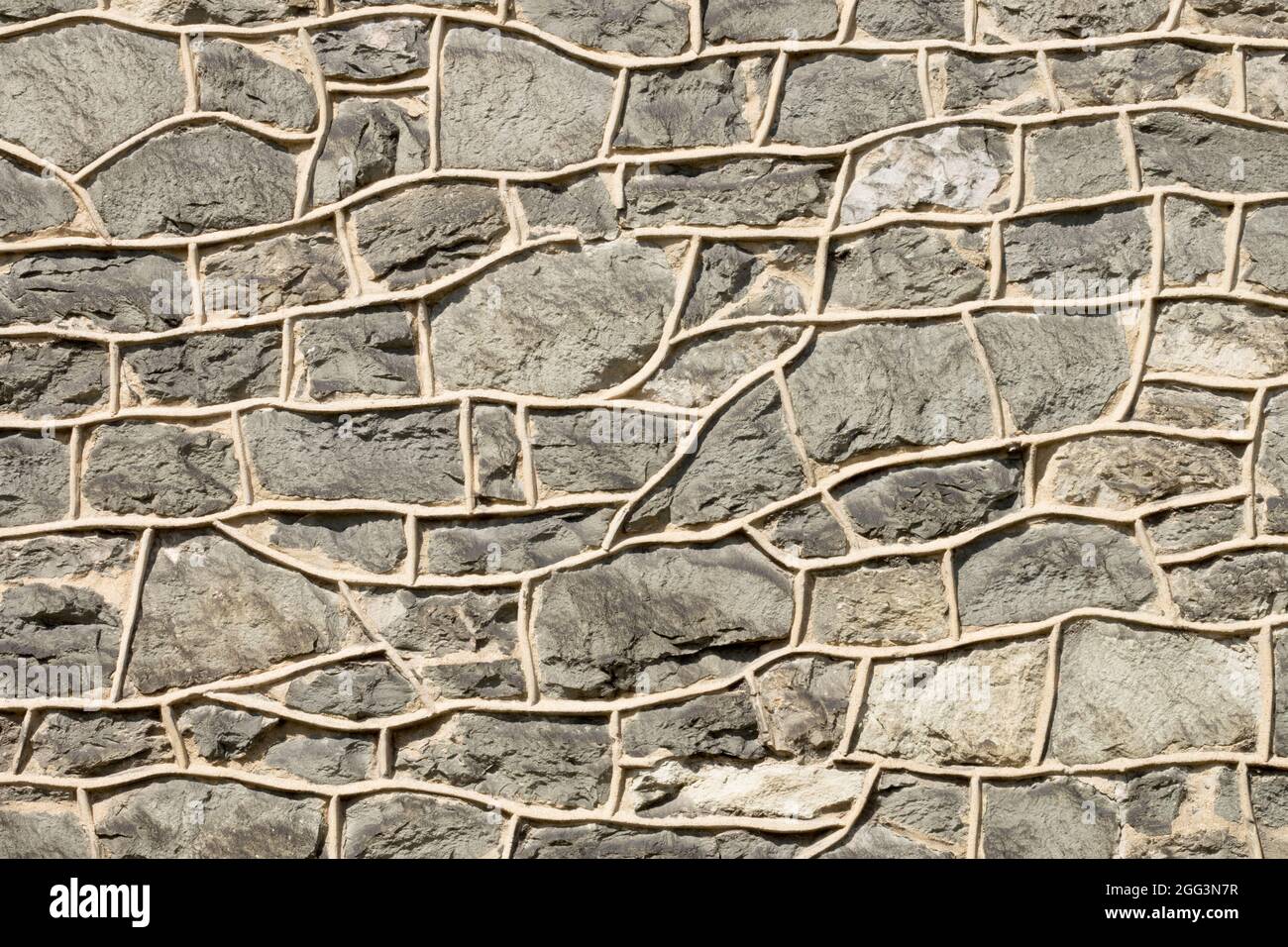 Stone wall background texture pattern joints Stock Photo - Alamy
