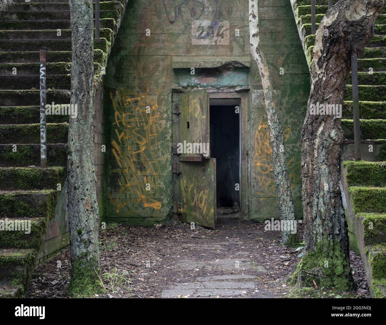 Open steel door of abandoned concrete military bunker in Hel, Poland ...