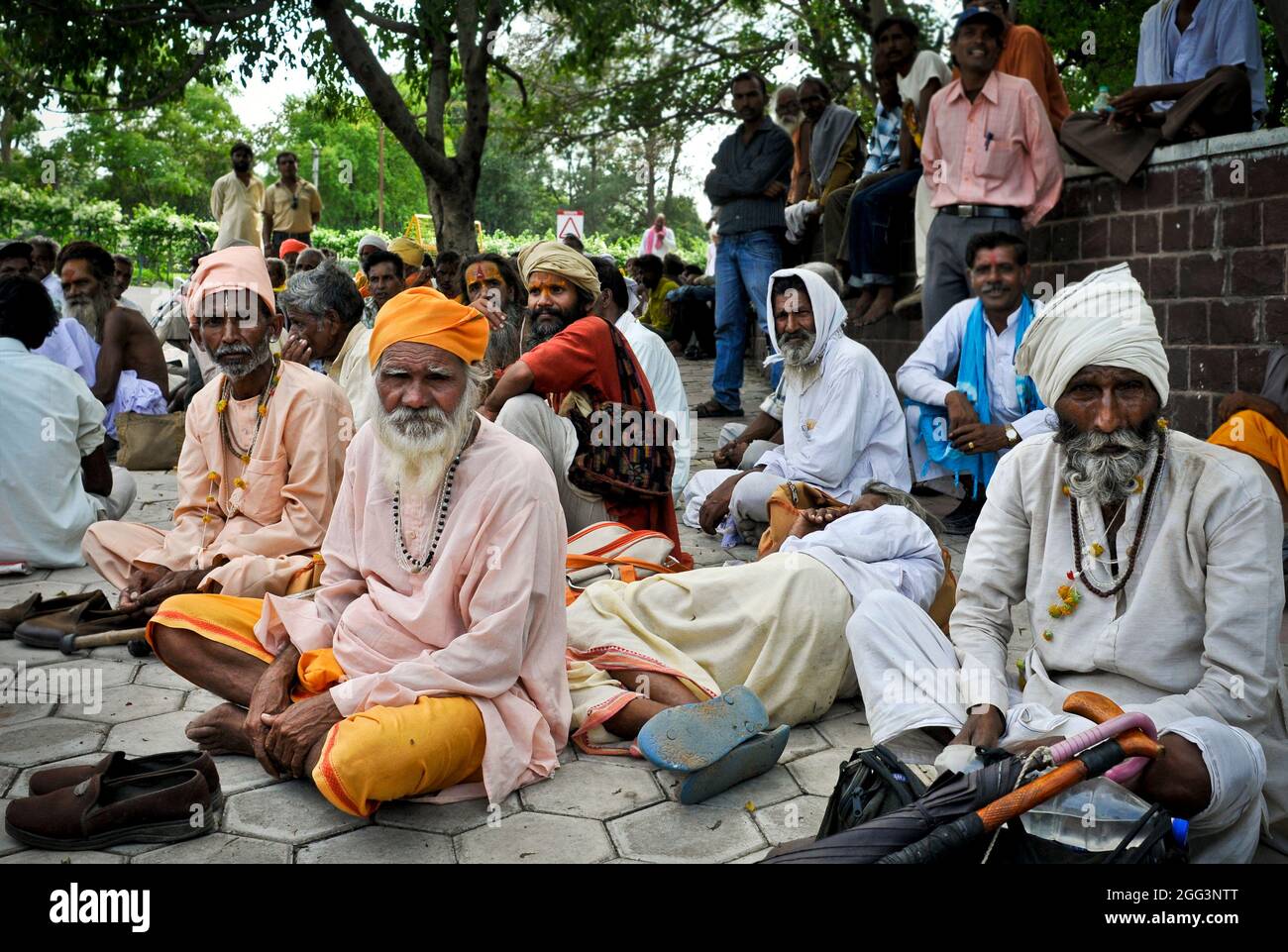 Hindu pilgrims and holy men or Sadhus participate in the holy ...