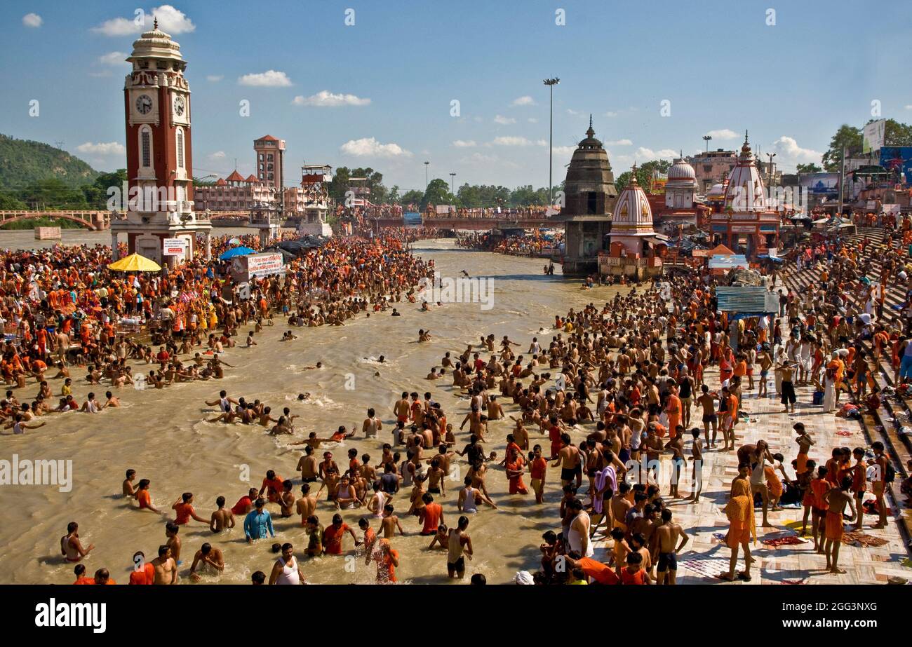Hindu pilgrims and holy men or Sadhus participate in the holy ...
