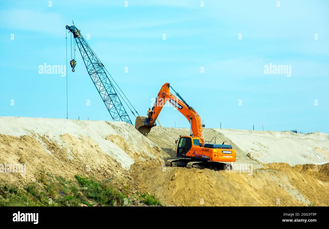Dnepropetrovsk, Ukraine - 08.17.2021: The excavator works at a ...