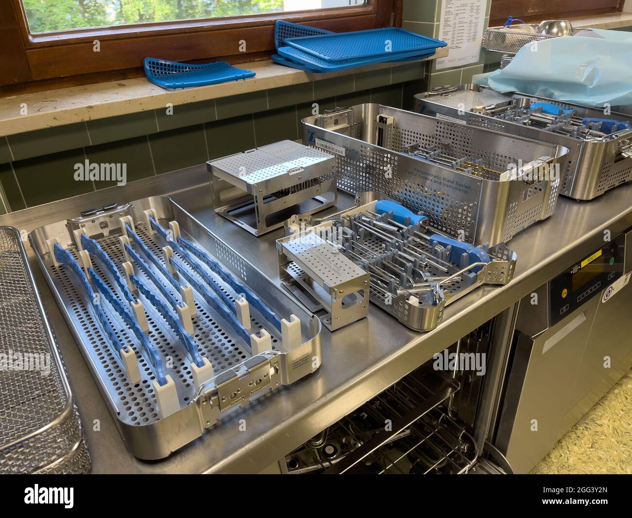 an instrument tray contains surgical instruments for implanting a ...
