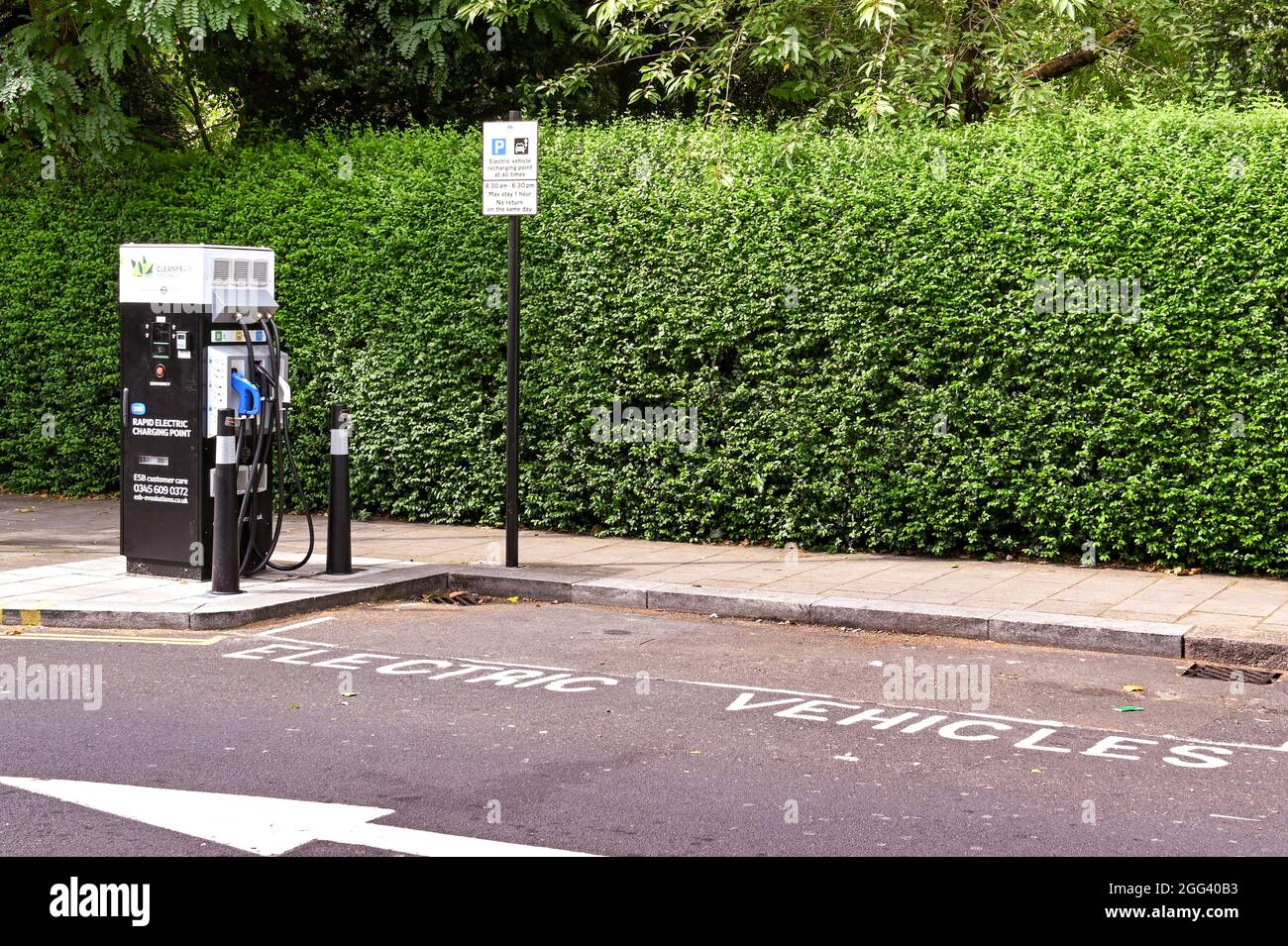 London, England - August 2021: Electric car charging station on a city ...