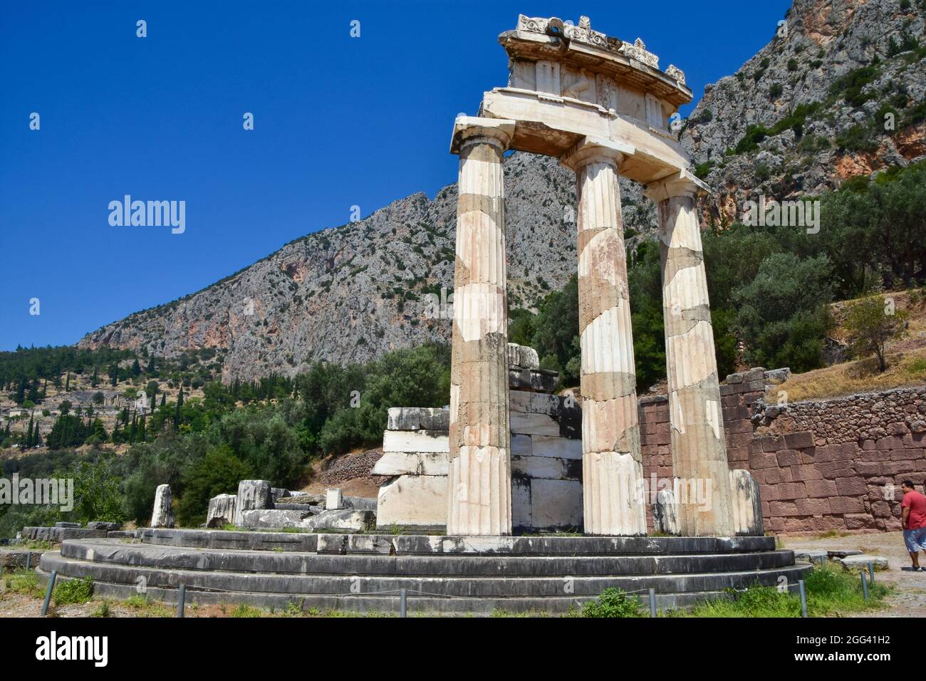 The Tholos or the circular temple at the Ancient Delphi, Greece Stock ...