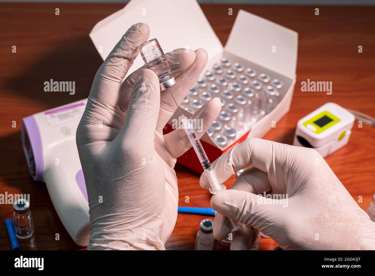 Sinovac coronavirus Vaccine and syringe in the bottle or vial for ...