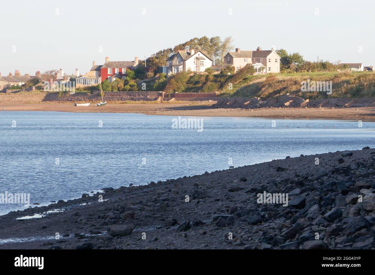 The village of Ravenglass in Cumbria viewed across the Esk branch of ...