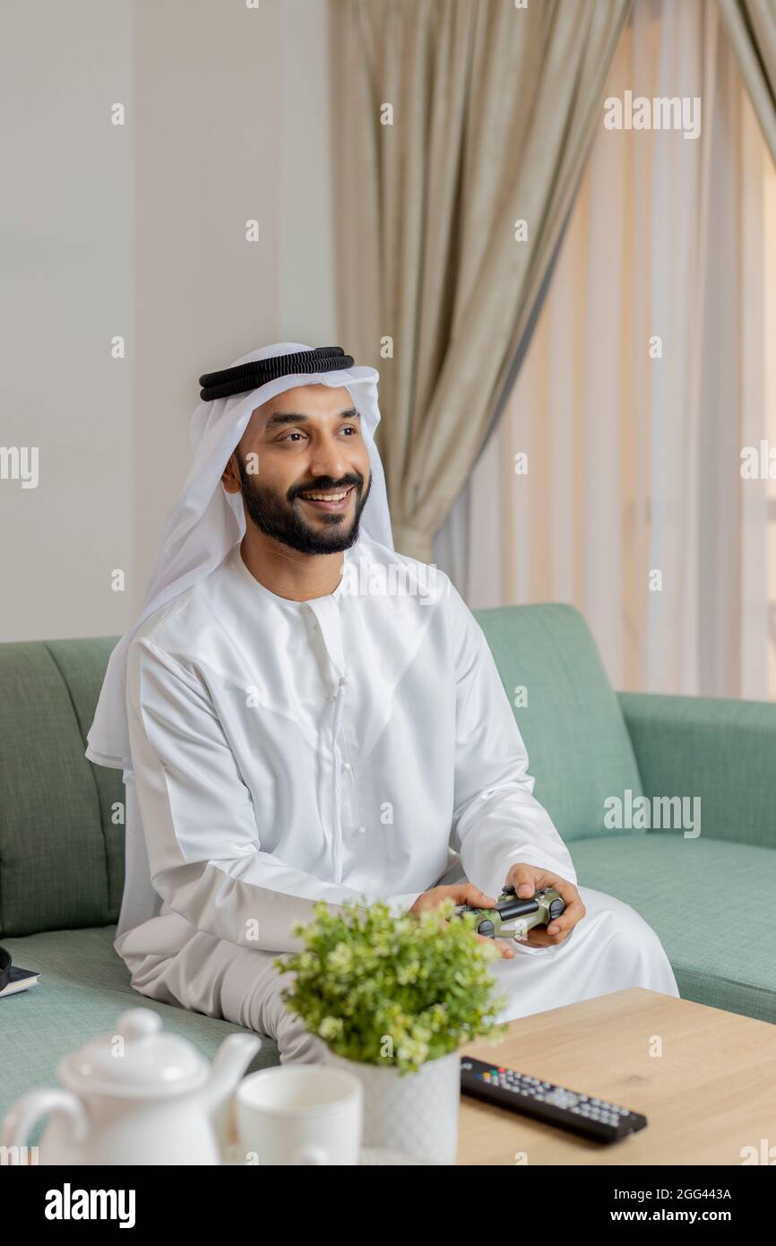Young Arab Emirati Entrepreneur working from home Stock Photo - Alamy