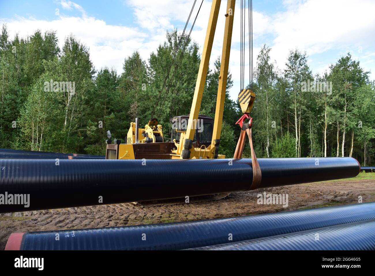 Natural Gas Pipeline Construction. Laying oil pipe in a trench in the ...