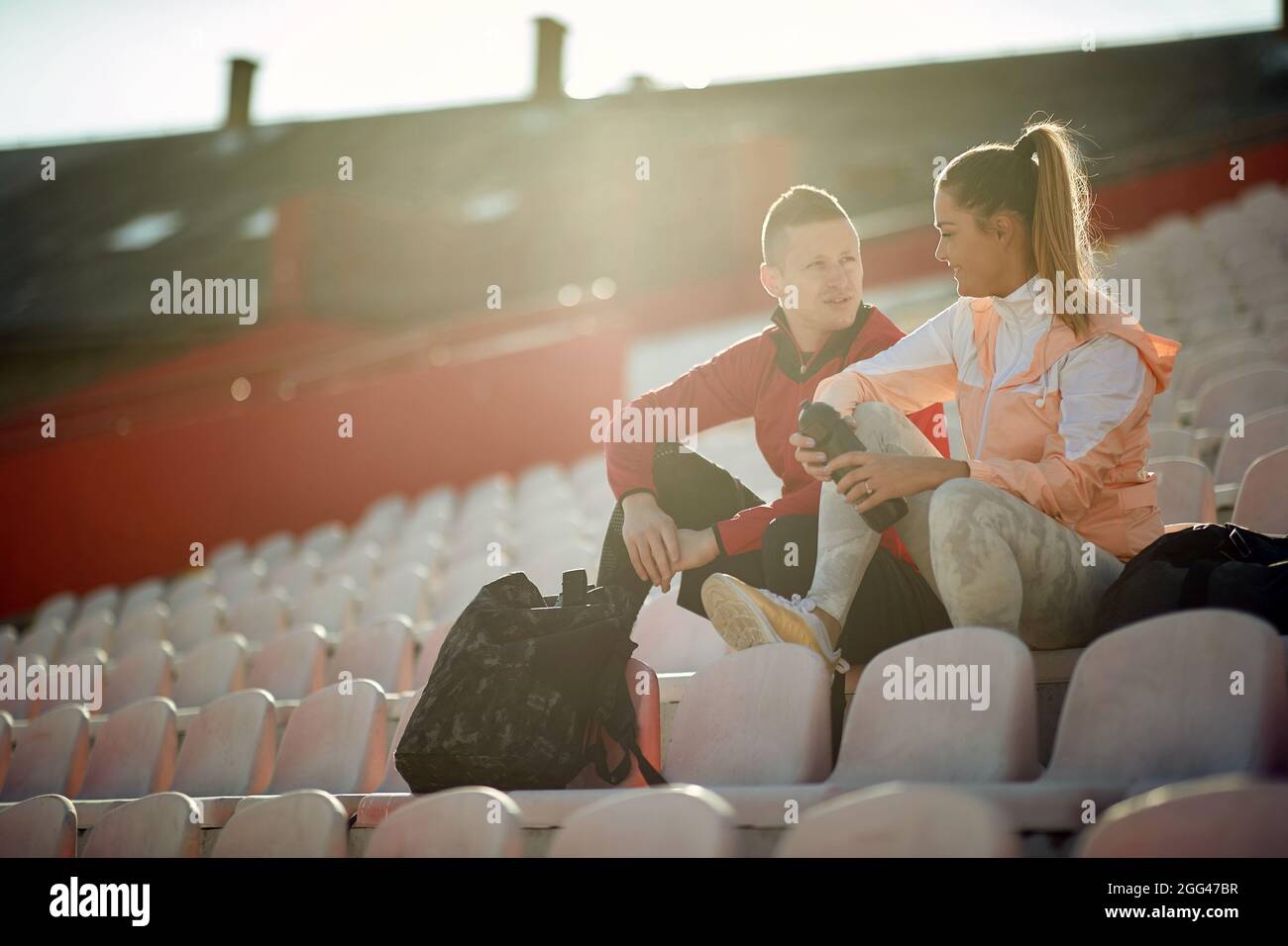 Runner talking to coach hi-res stock photography and images - Alamy