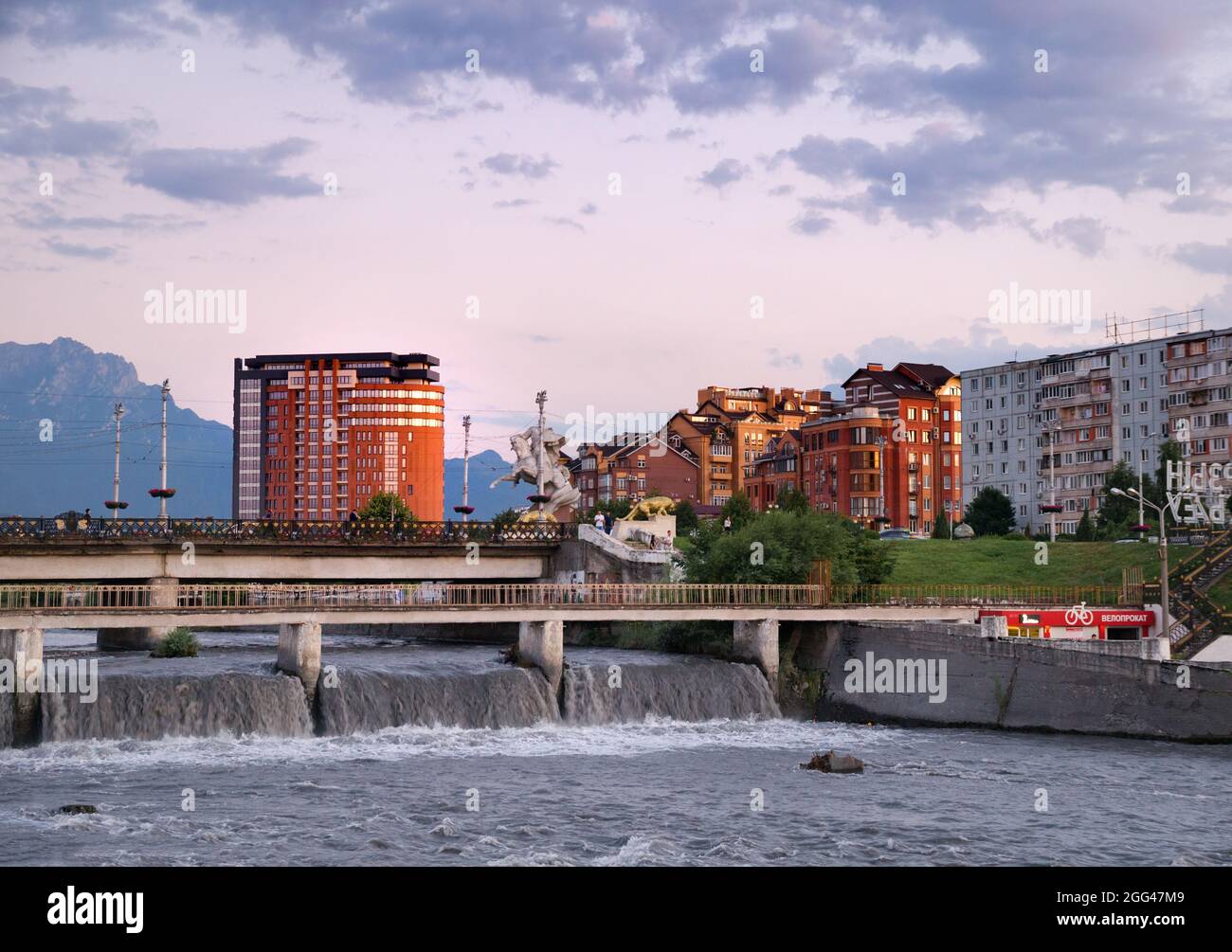 Summer sunset view on Vladikavkaz downtown buildings with Stolovaya ...
