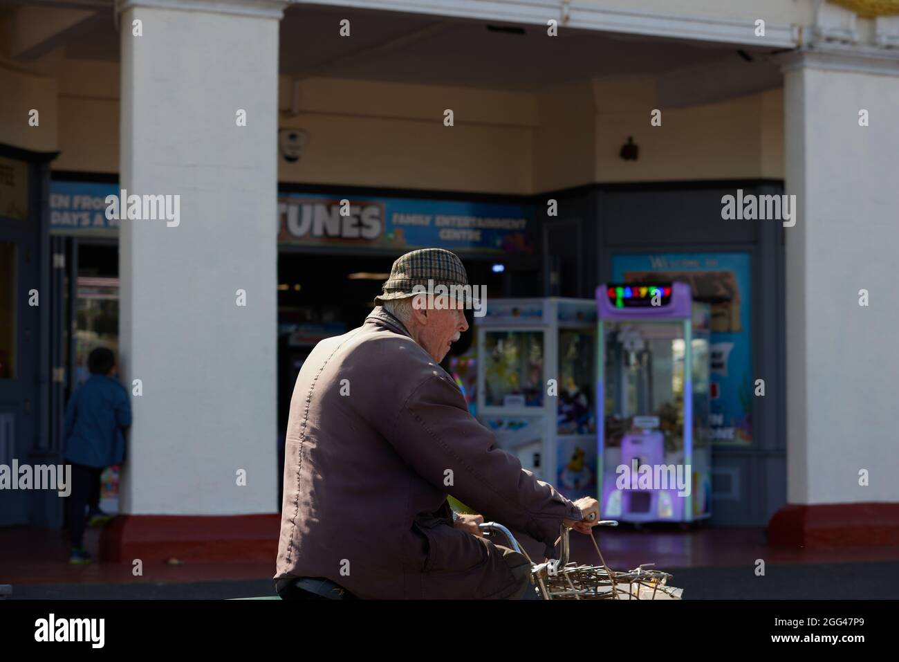 Senior citizen seen riding a bike in summer Stock Photo - Alamy