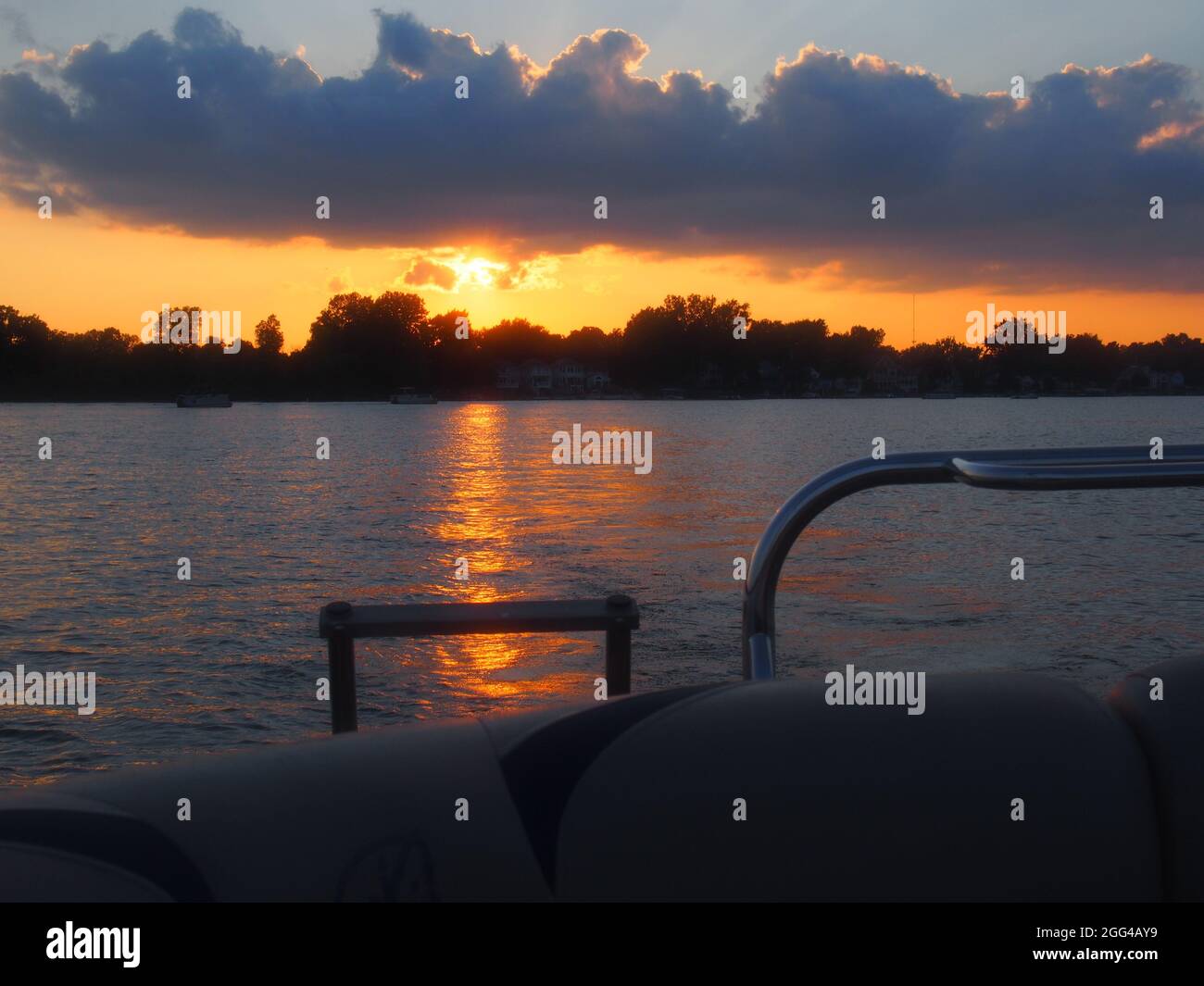 August Lake Sunset from a Pontoon Stock Photo - Alamy