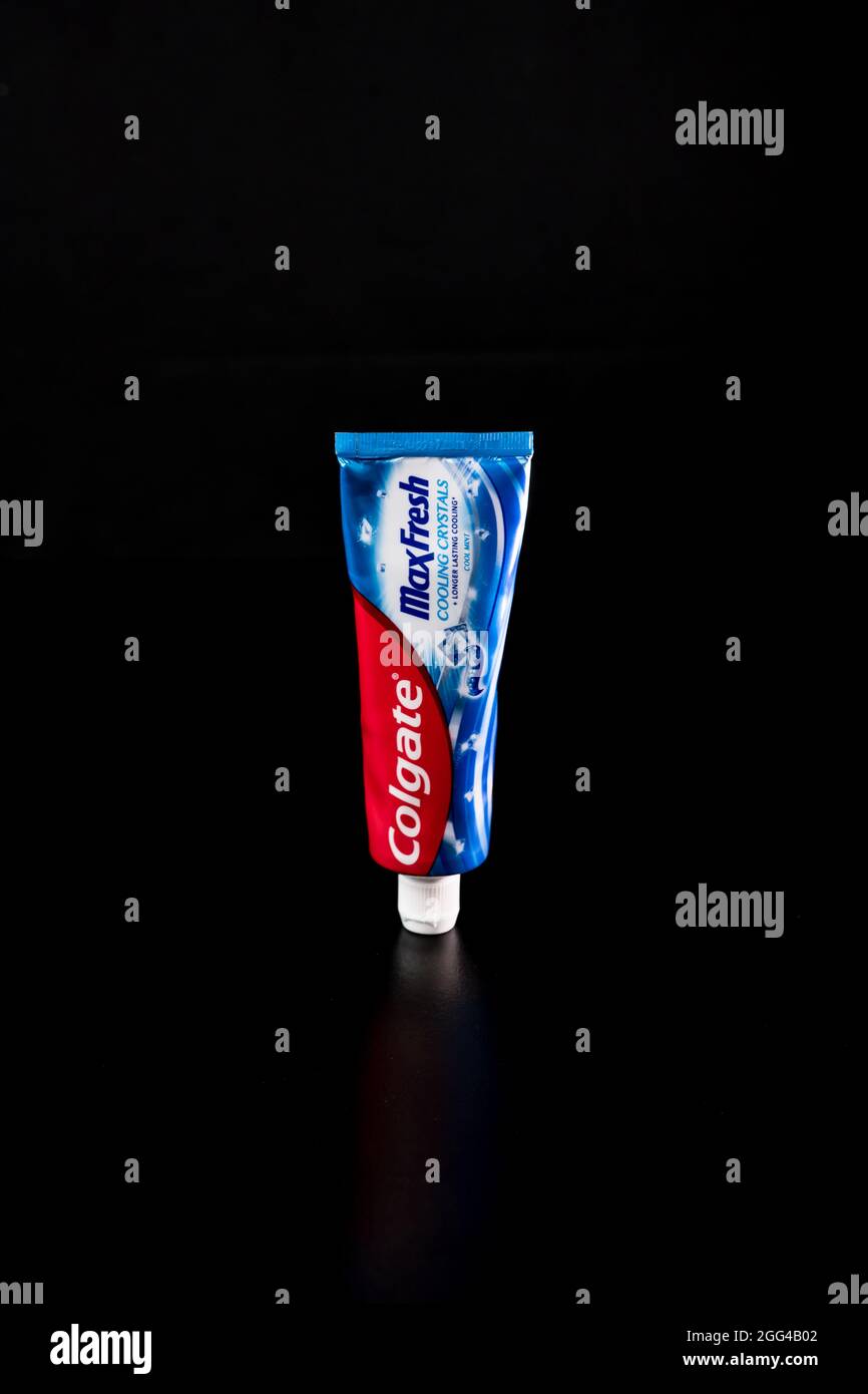 Colgate MaxFresh toothpaste tube on black background in Bucharest ...