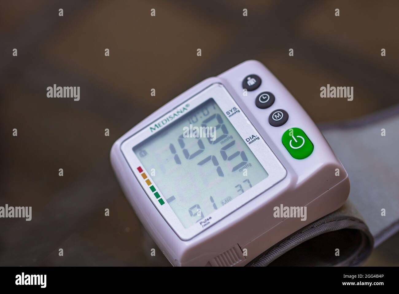 Close up, detail of blood pressure cuff monitor isolated. Digital blood ...