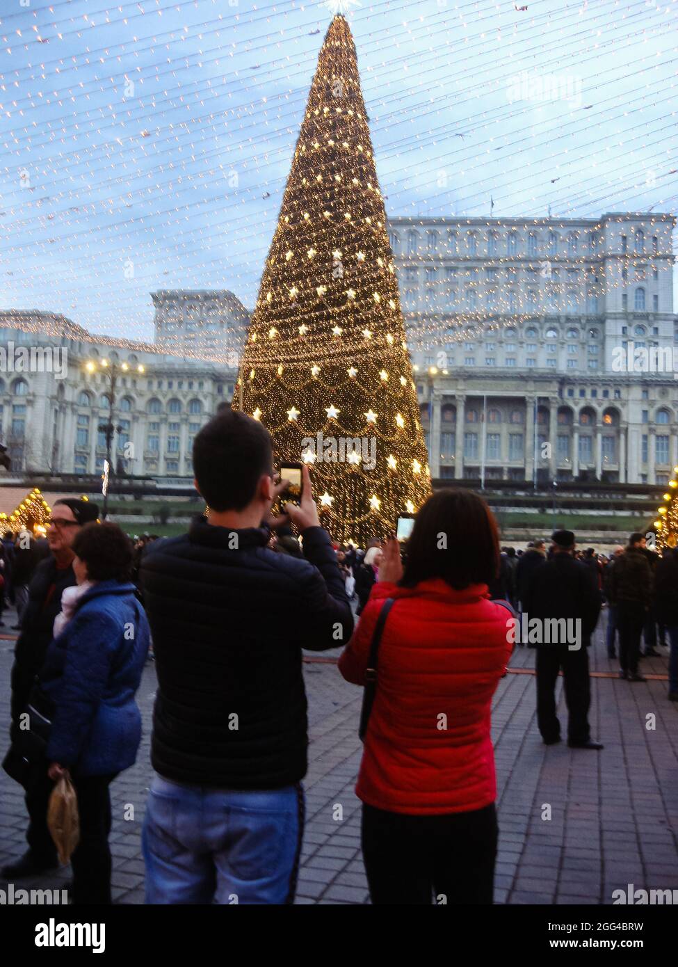 Decorated huge Christmas tree, lights, decorations, hot wine, hot ...