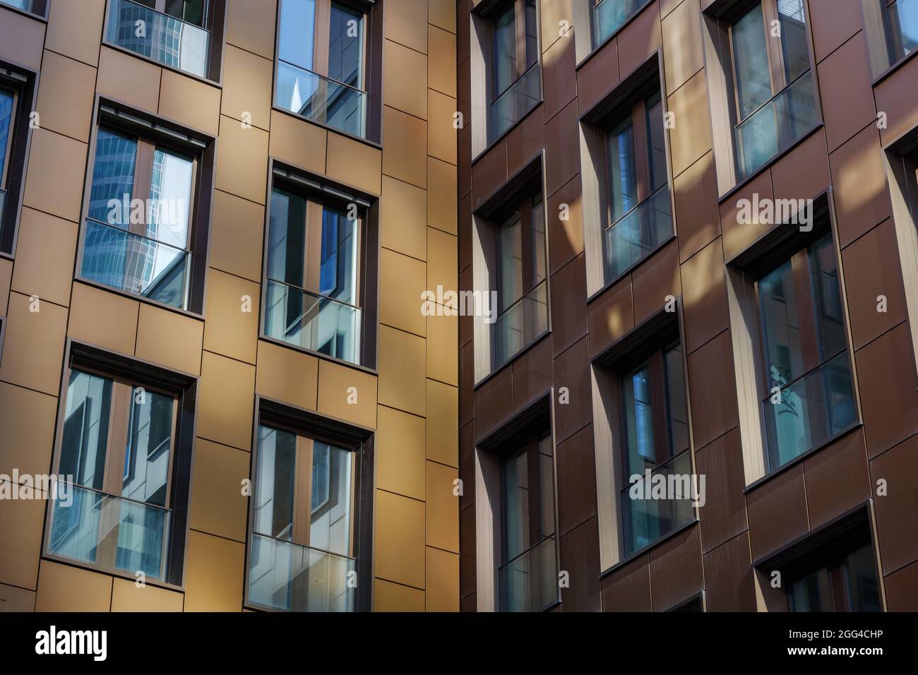 Exterior architectural detail modern golden facade of High-rise office ...