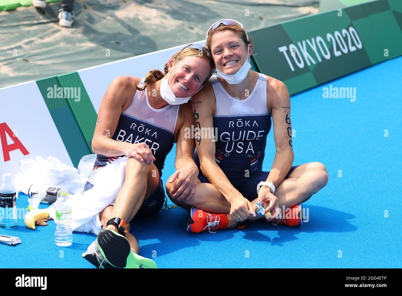Tokyo, Japan. 28th Aug, 2021. (L-R) US's guide Jillian Elliott cools ...