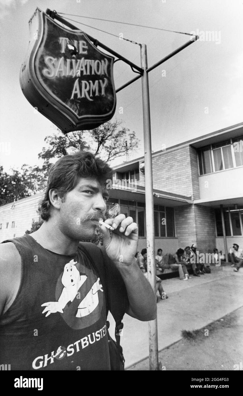 Austin Texas USA, circa 1985: Male transient smoking a cigarette ...