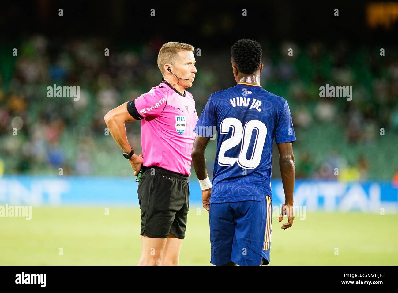 Referee, Alejandro Jose Hernandez Hernandez (L) and Vinicius Junior (R ...