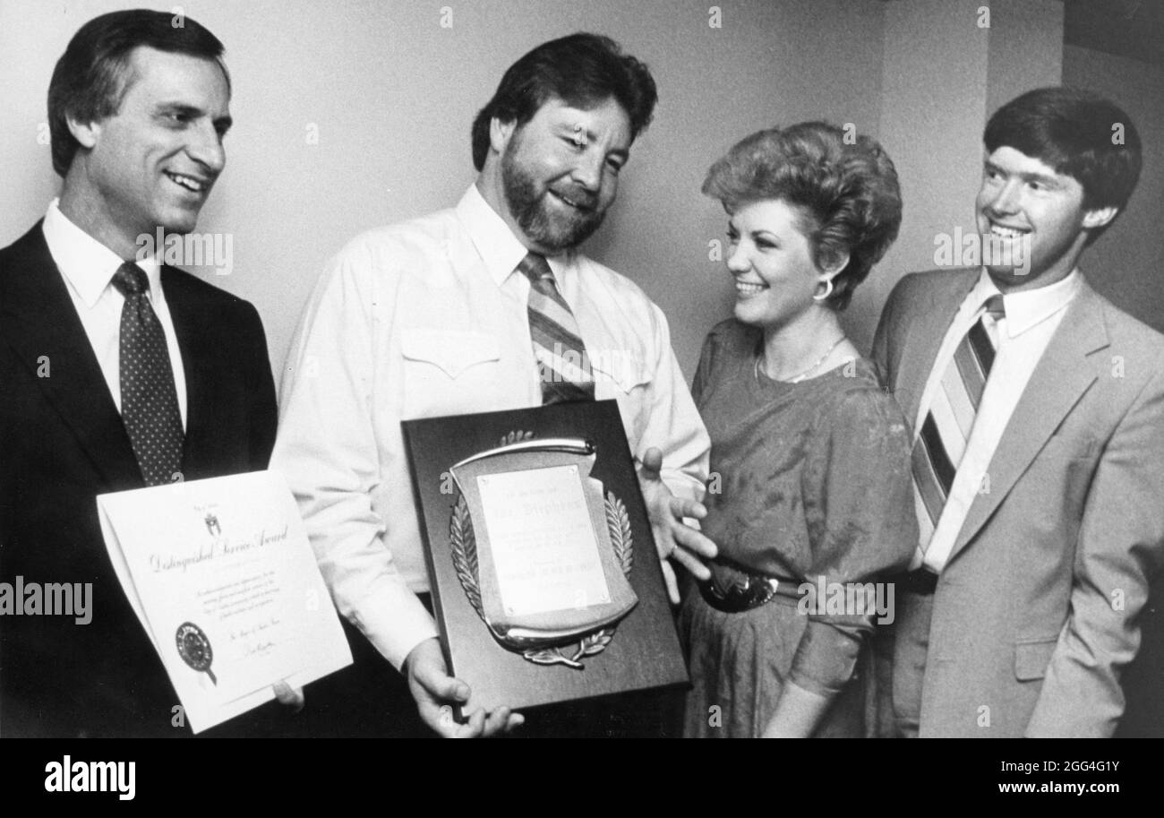 Austin Texas USA, circa 1984: Man holds award for heroism for pulling ...