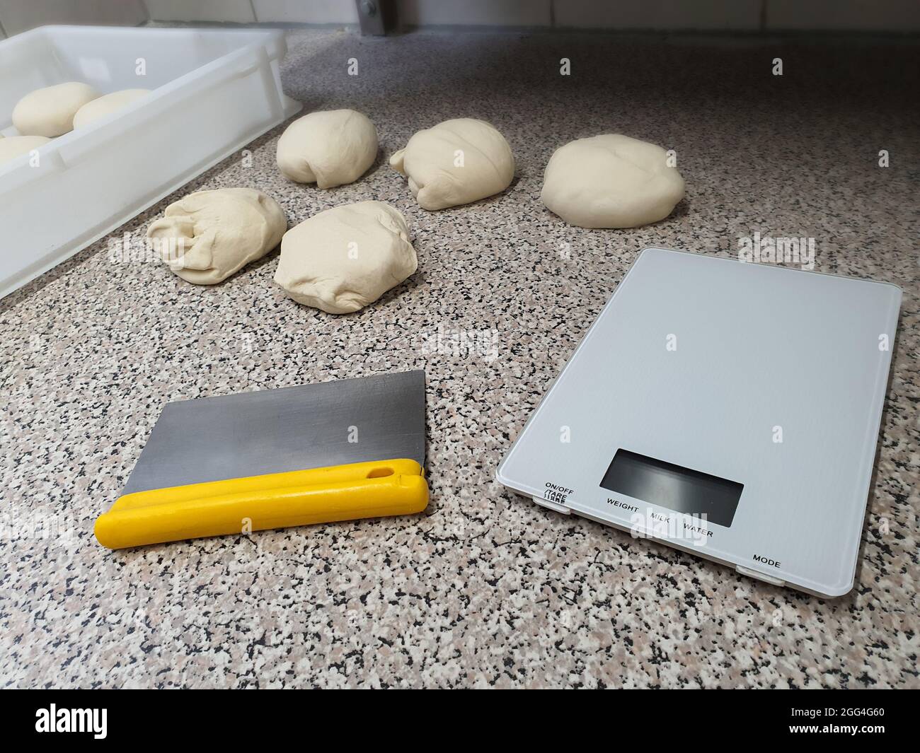 Preparing the dough for pizza, scales Stock Photo - Alamy