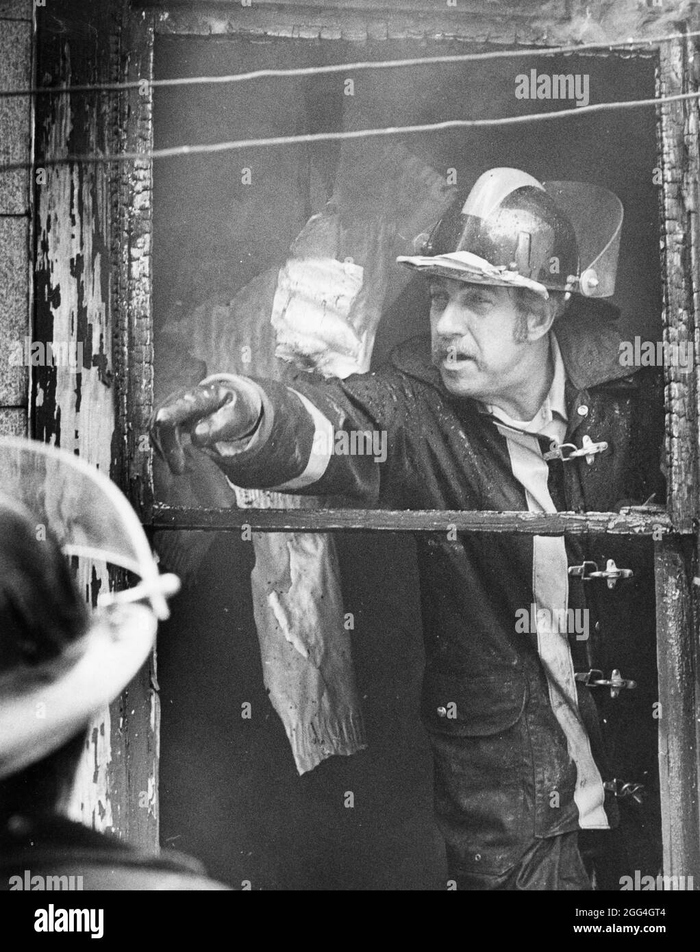 Austin Texas USA, 1983: Fireman working inside burning house. ©Bob ...