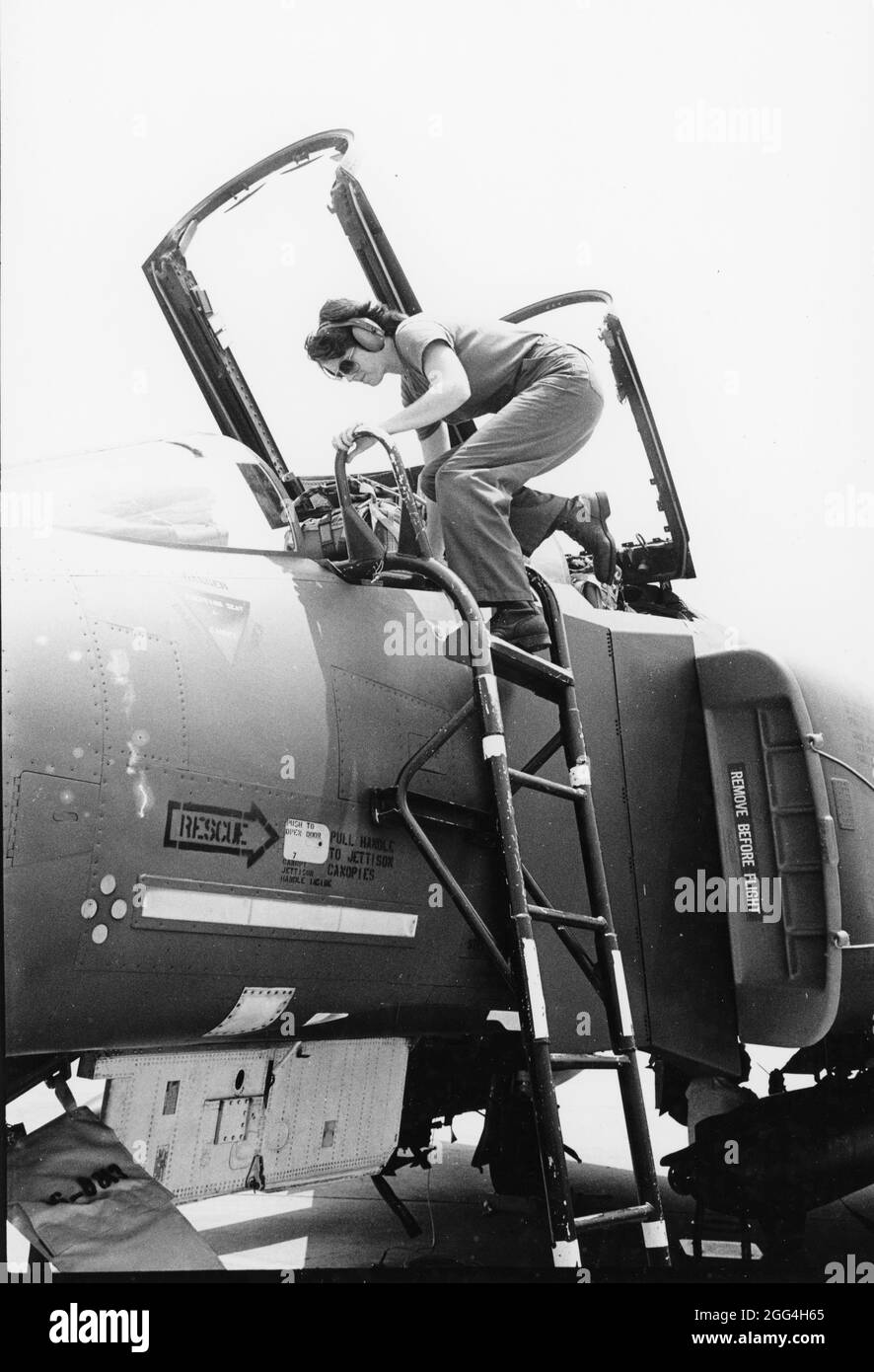 Austin Texas USA, 1984: Female U.S. Air Force pilot inspects RF-4 jet ...