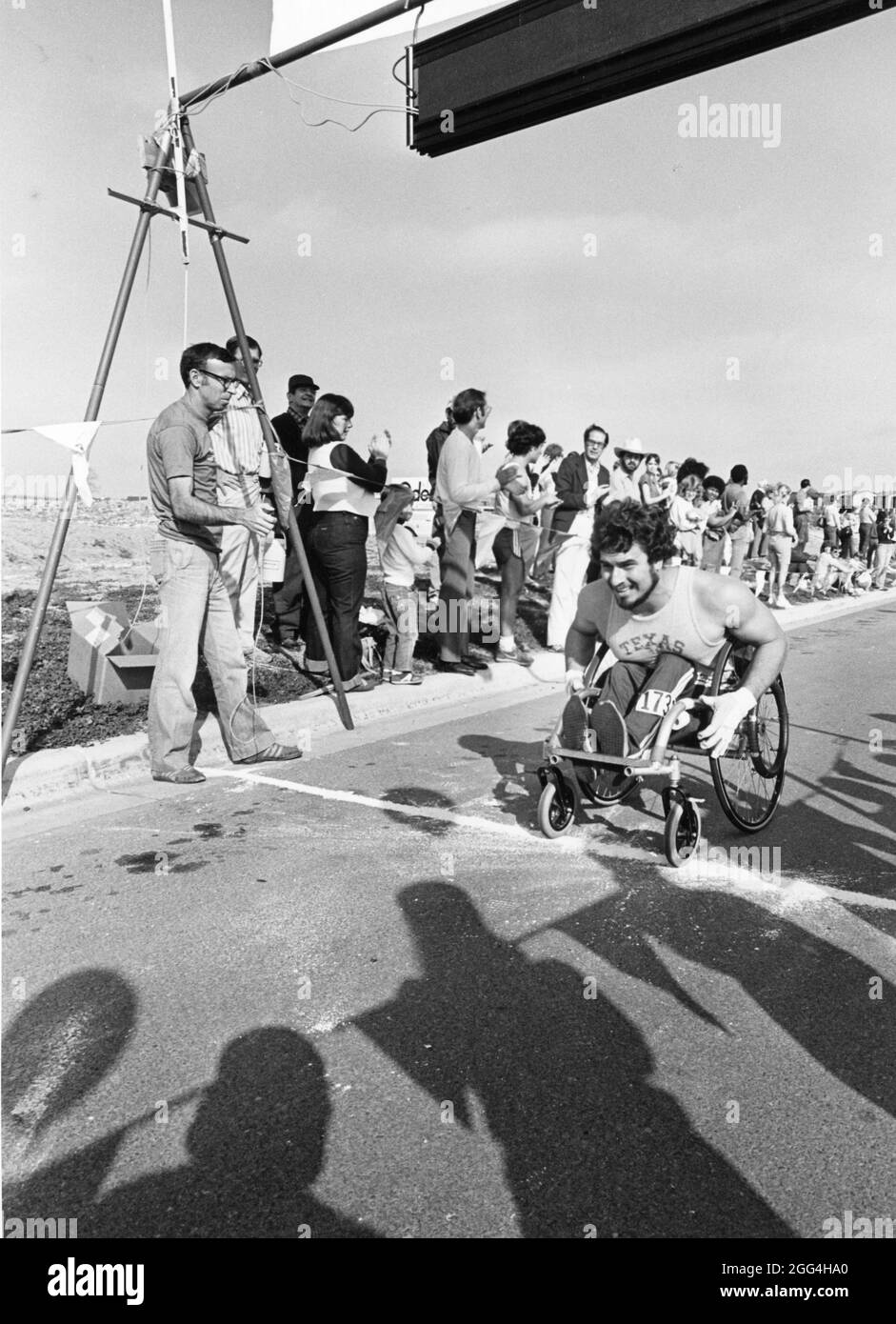 Austin Texas USA, 1990: Handicapped wheelchair athlete crosses finish ...
